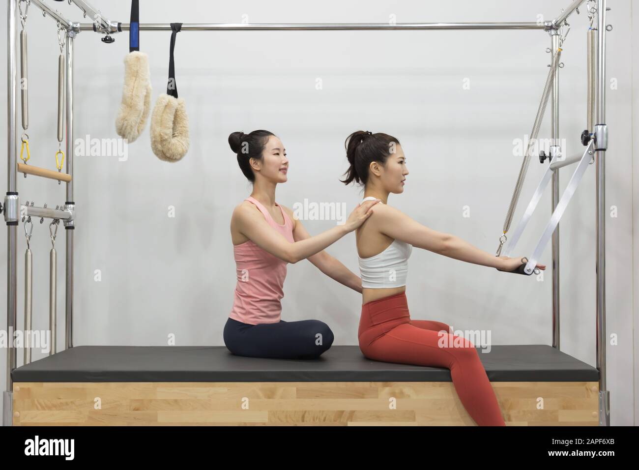 Healthy life, exercising pilates using pilates device 300 Stock Photo ...