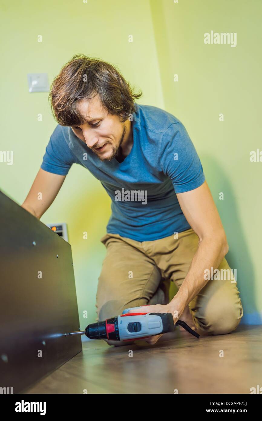 Frustrated Man Putting Together Self Assembly Furniture Stock Photo - Alamy