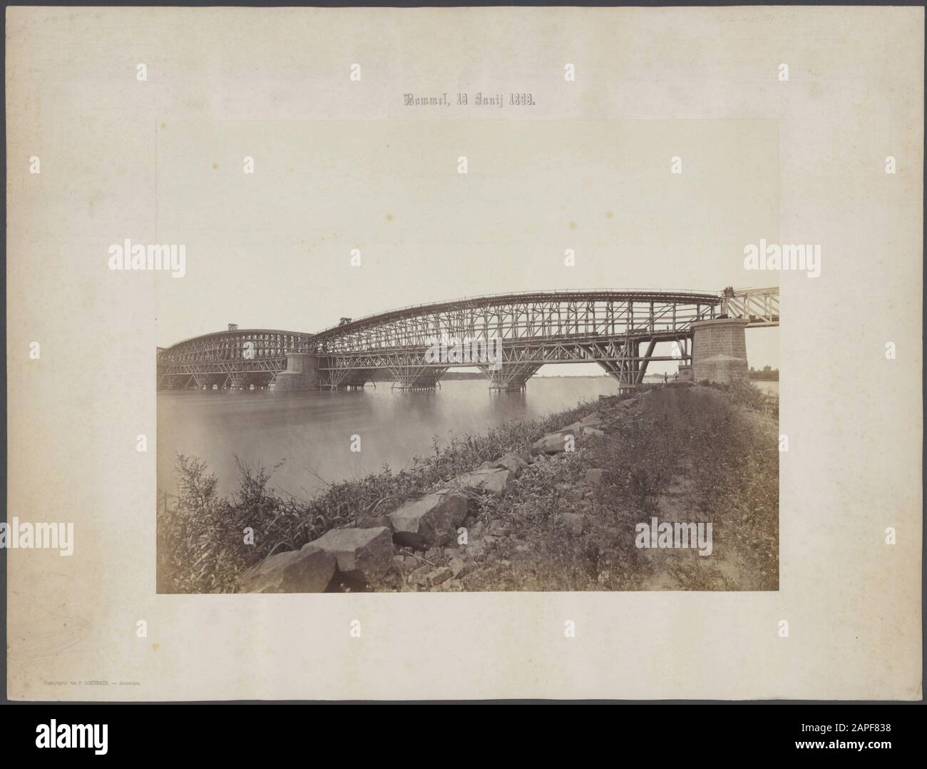 Construction of the bridge, viewed from a point of view on the bank ...