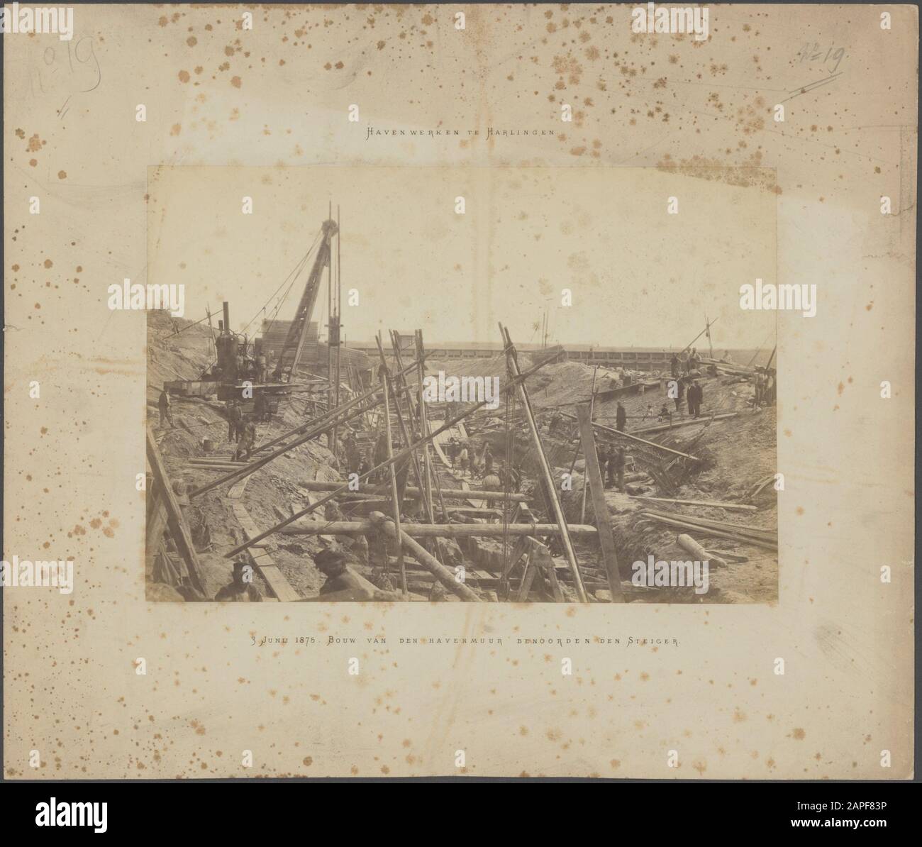 Construction of the port wall north of the jetty; port walls; port ...