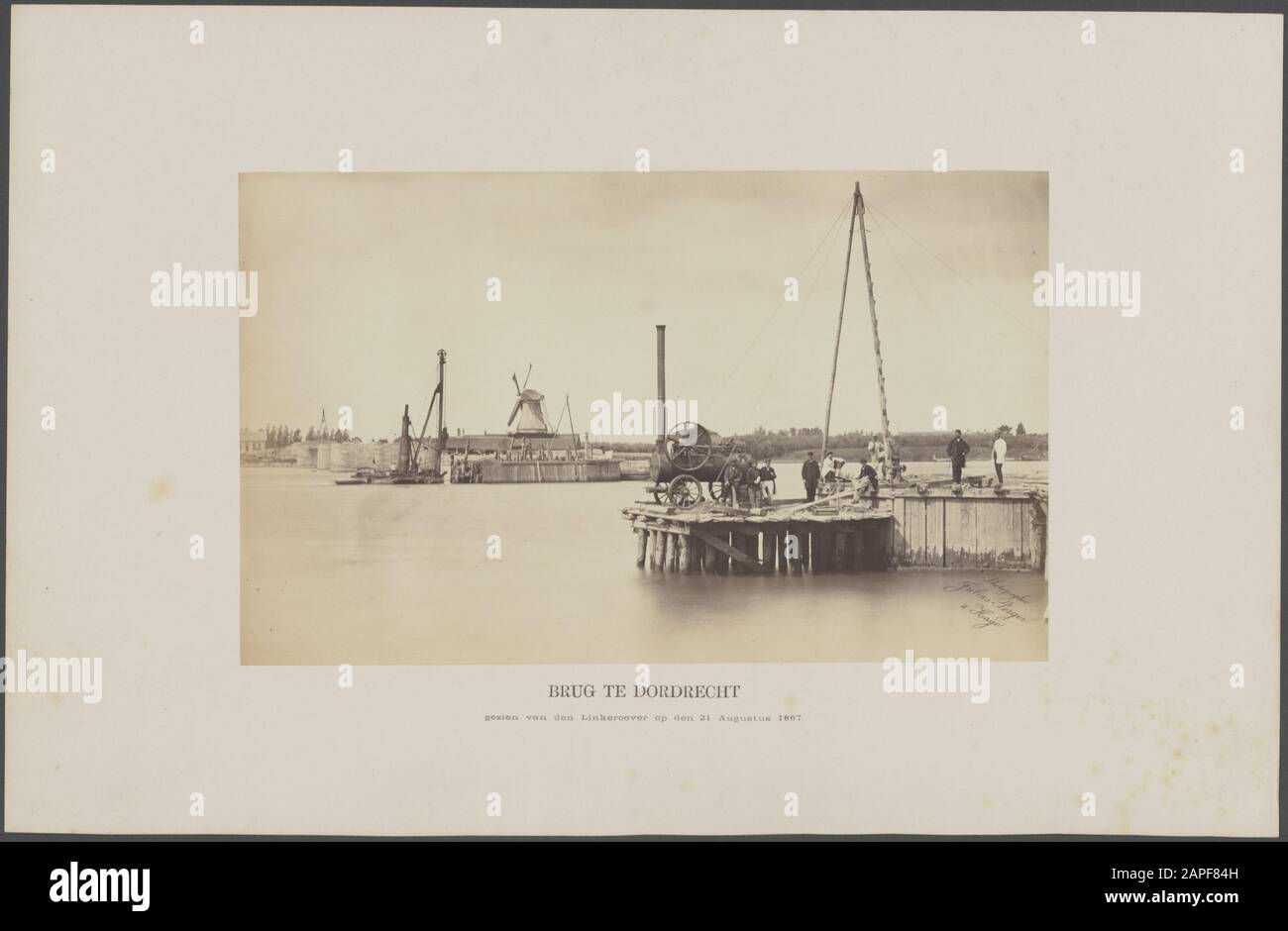 Construction of the pillars for the bridge using steam-powered hoists ...