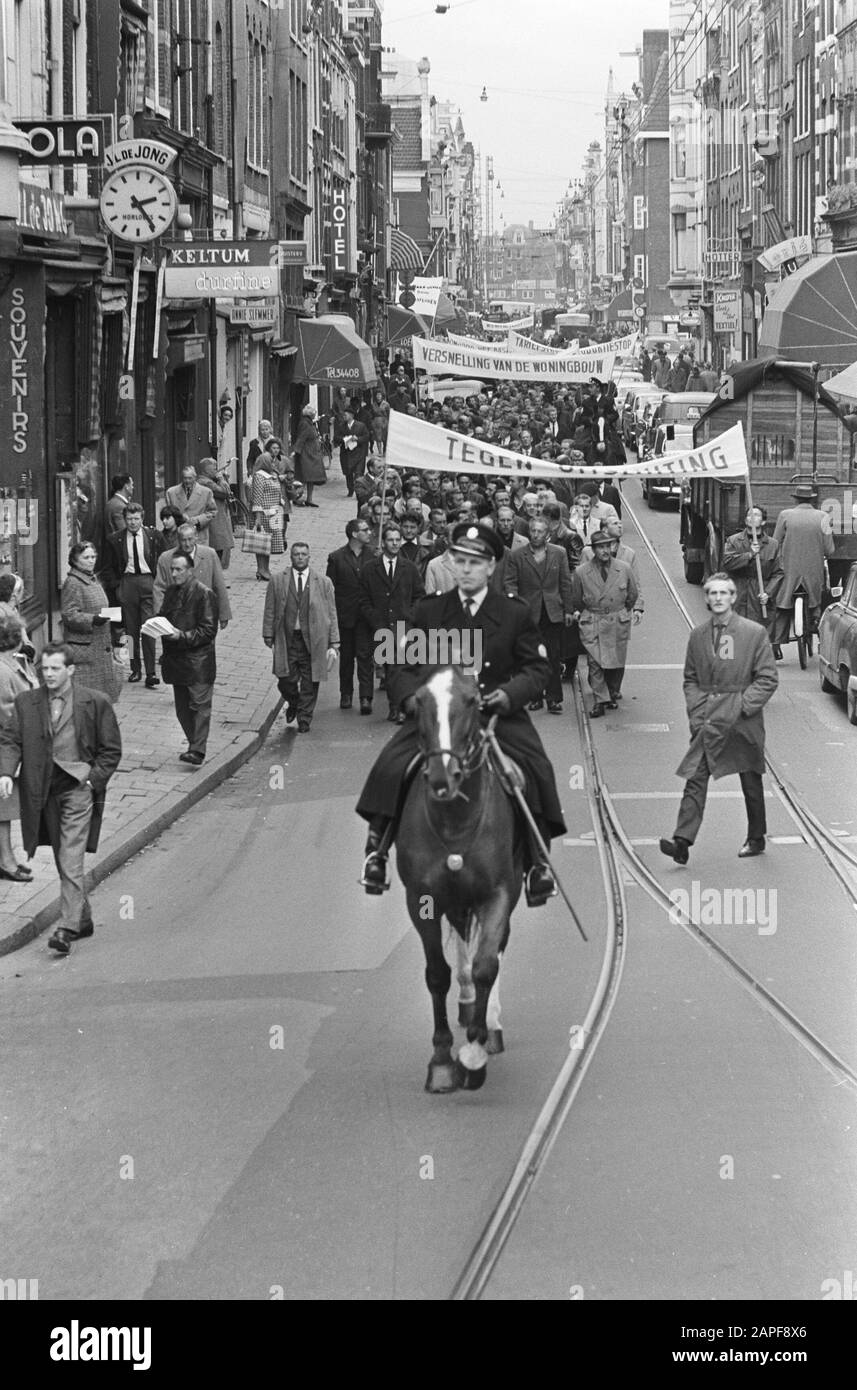 Construction workers demonstrate, the procession pulls through downtown ...
