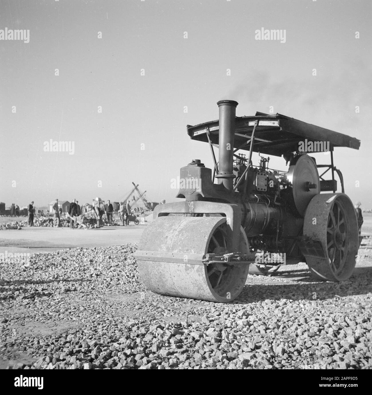 Schiphol Description: Construction work Schiphol. Steamroller equalizes ...