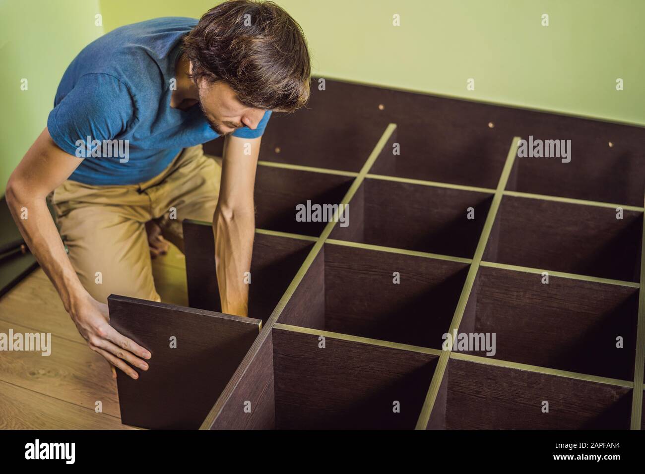 Frustrated Man Putting Together Self Assembly Furniture Stock Photo - Alamy