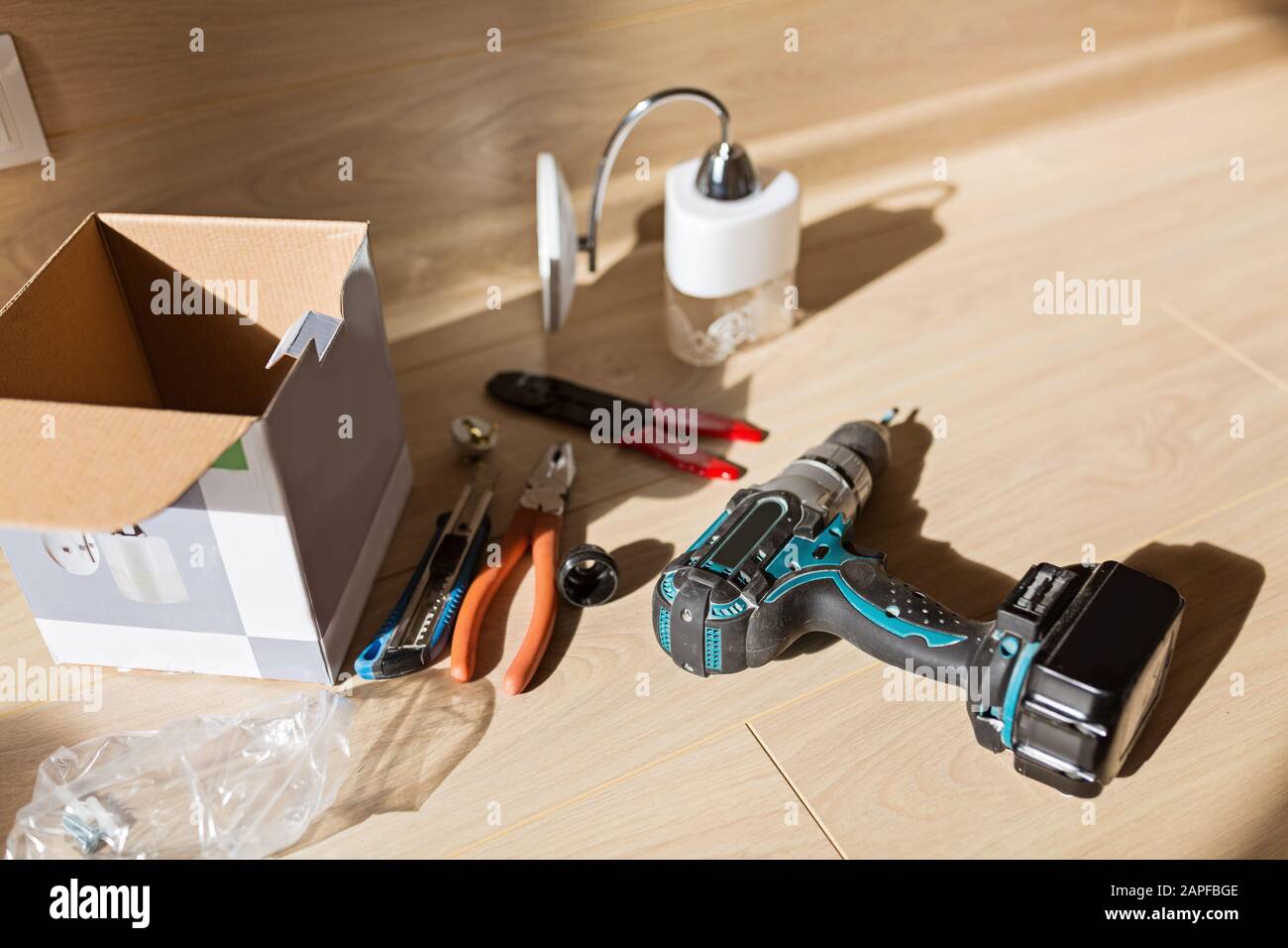 Tools for minor repairs on the wooden floor. DIY accessories ready to ...
