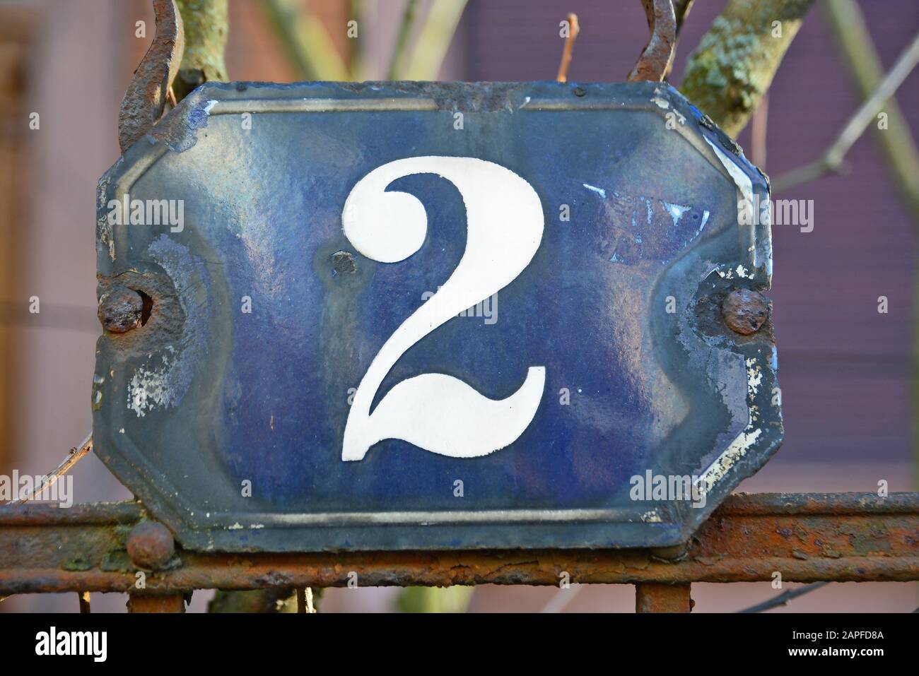 A house number plaque, showing the number two (2 Stock Photo - Alamy