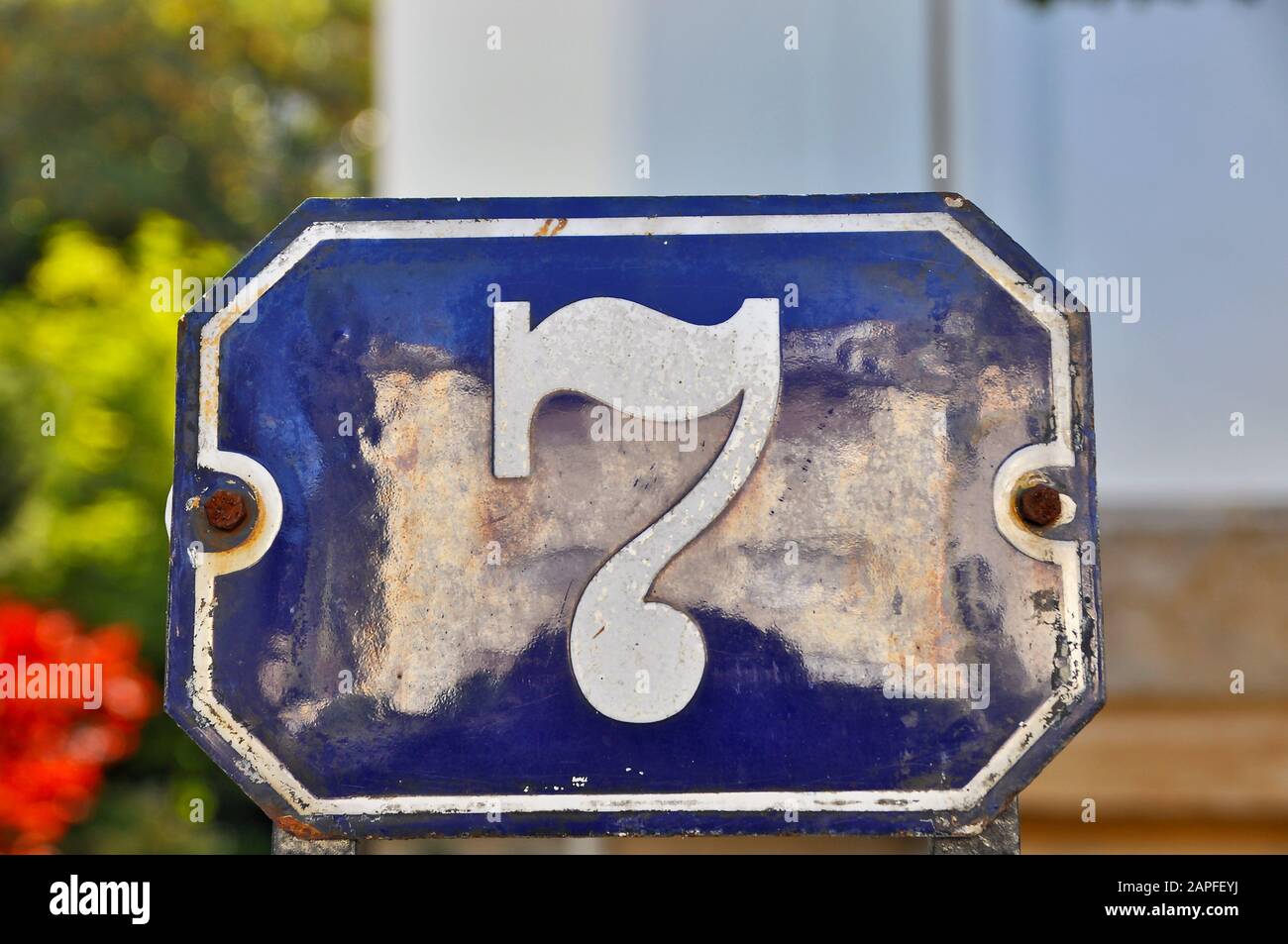 A house number plaque, showing the number seven (7 Stock Photo - Alamy
