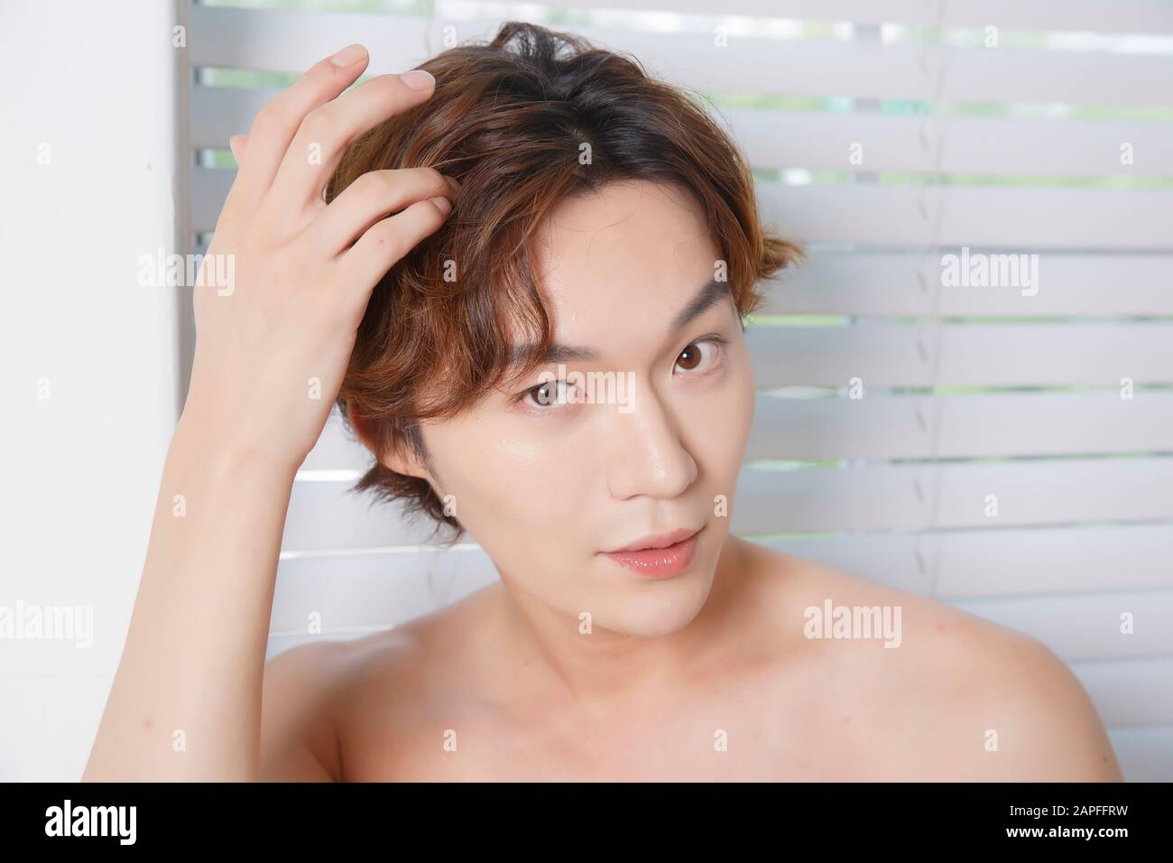 Close-up portrait of attractive young asian man, single man's lifestyle ...