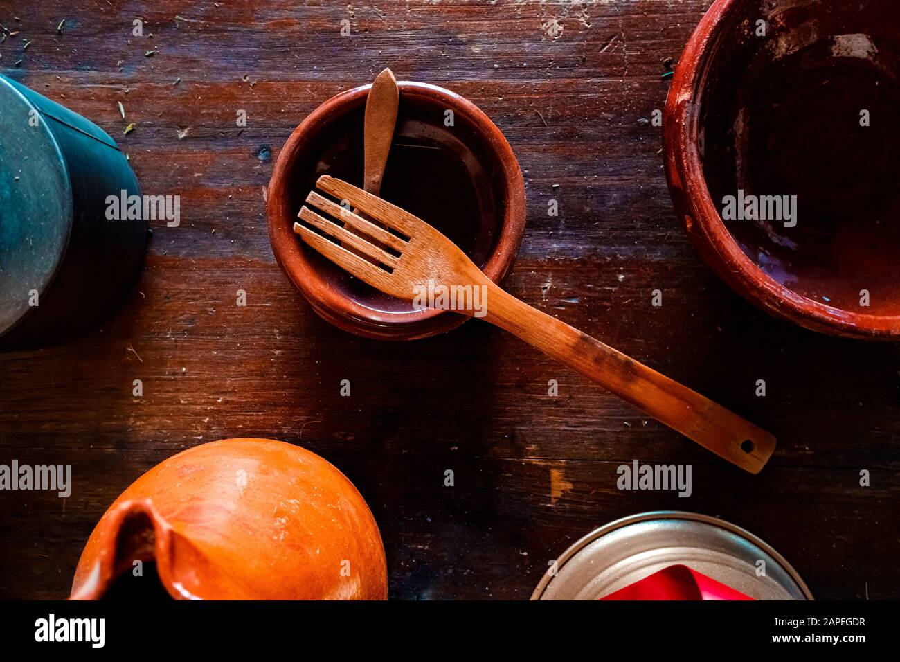 Old wooden and clay kitchen utensils Stock Photo - Alamy