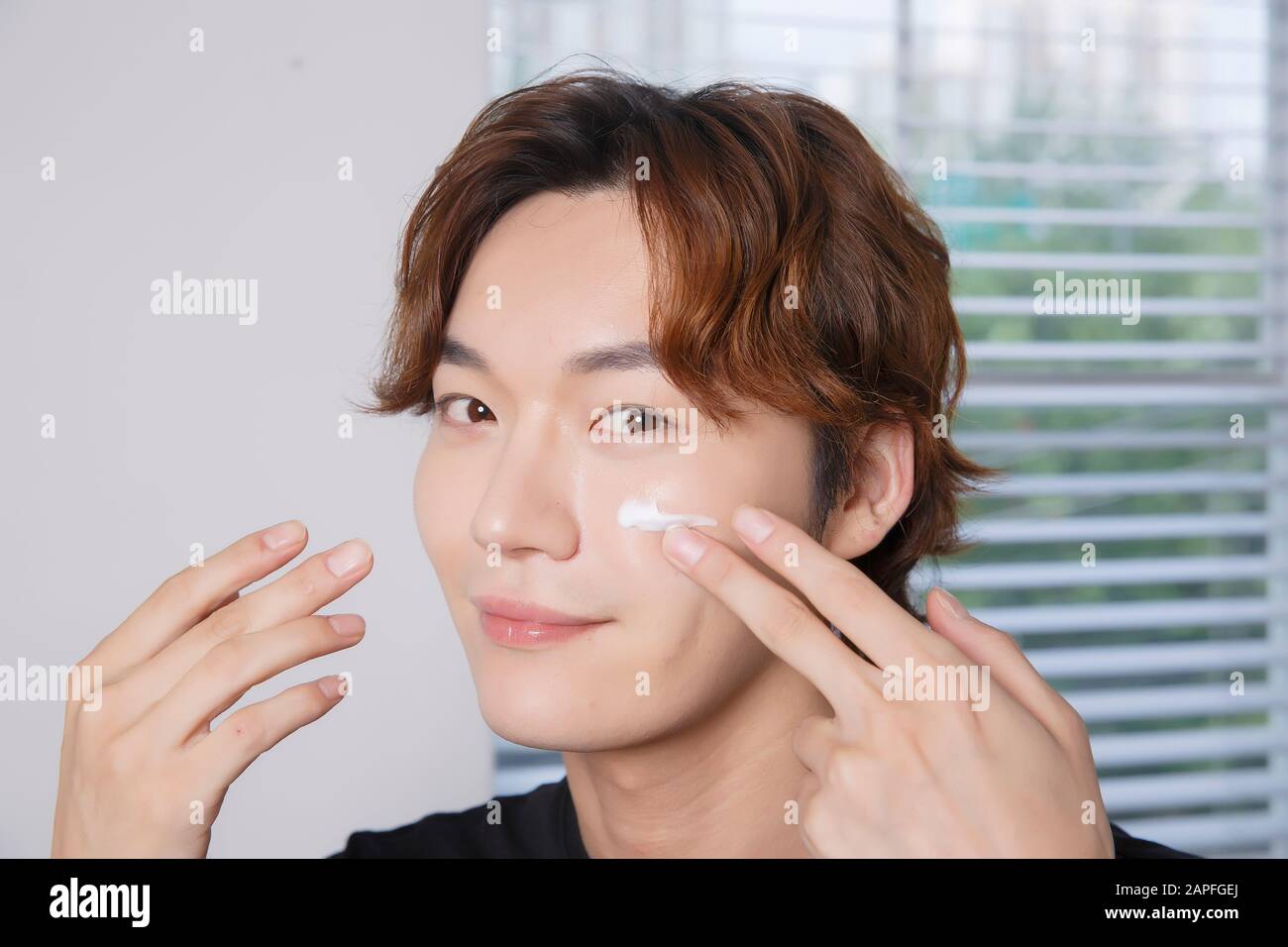 Close-up portrait of attractive young asian man, single man's lifestyle ...