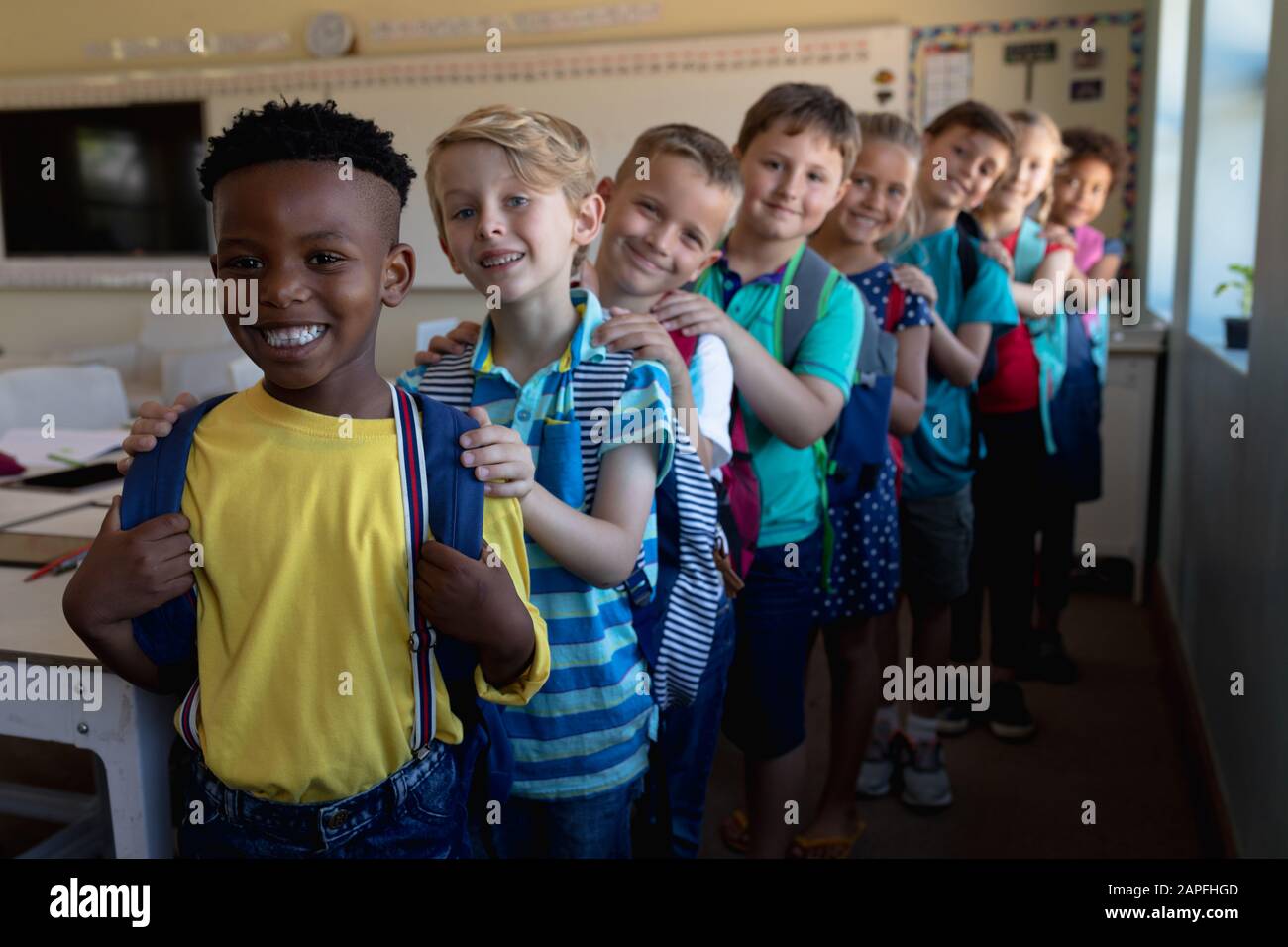 Elementary student walking classroom hi-res stock photography and ...