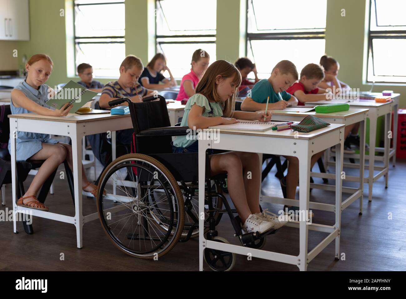 Child In Wheelchair In Classroom