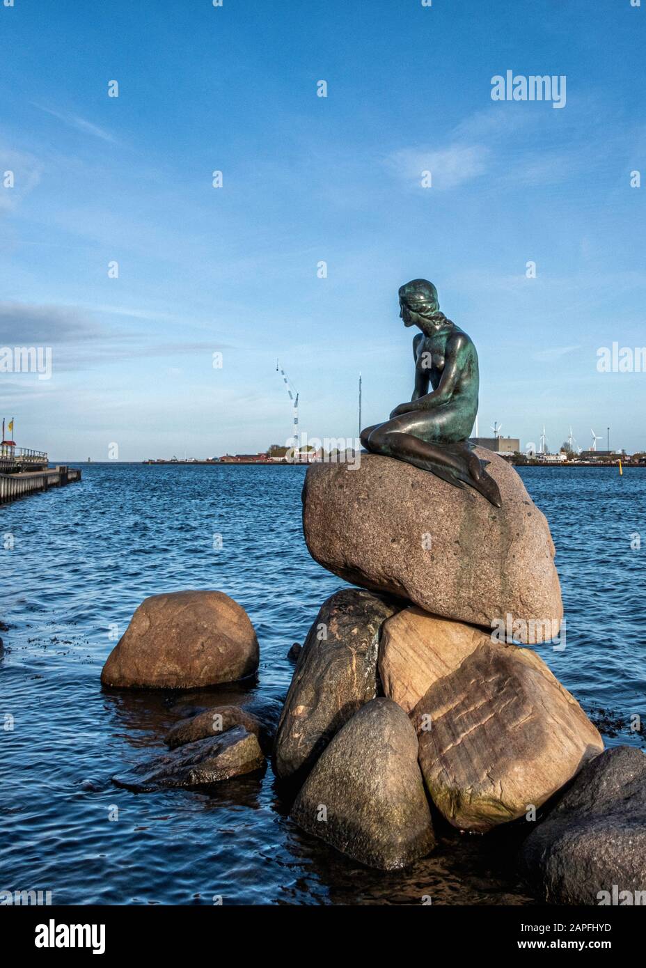 The Little Mermaid (1913) - bronze sculpture by sculptor Edvard Eriksen. The mermaid sits on a ...
