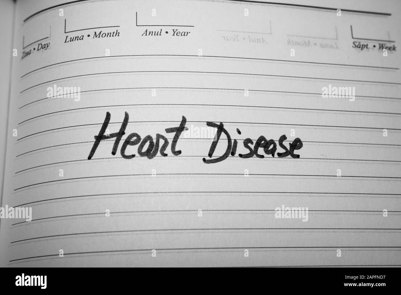 Heart disease, handwriting text on page of office agenda. Copy space ...