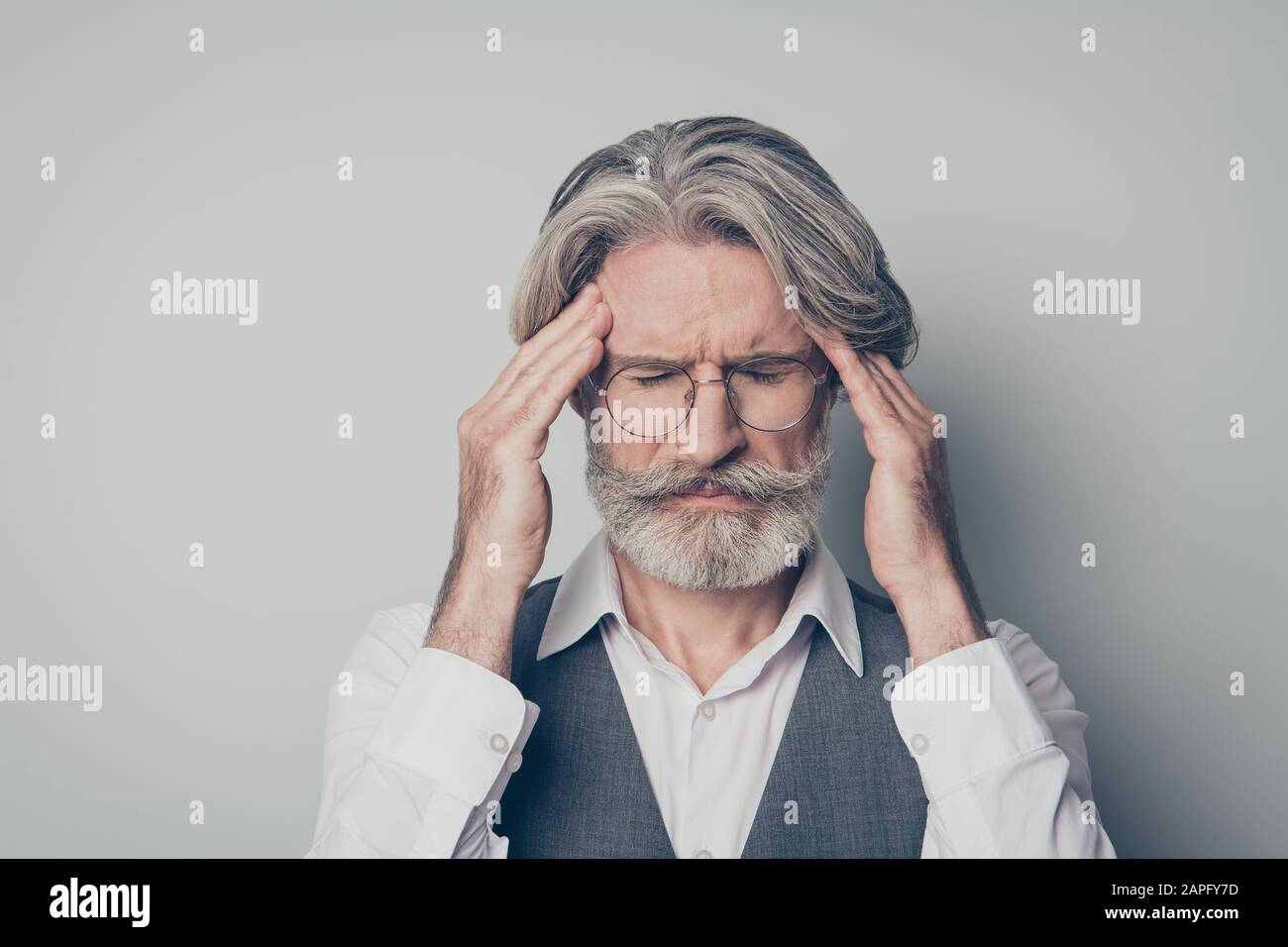 Close up photo of overworked frustrated old man suffer migraine touch ...