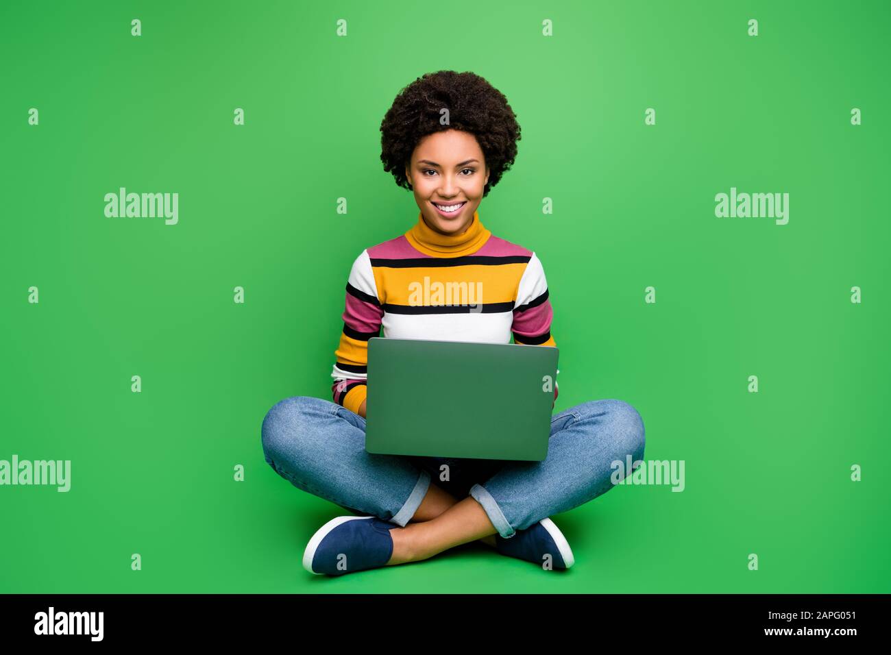 Full body photo of positive afro american girl sit legs crossed folded ...