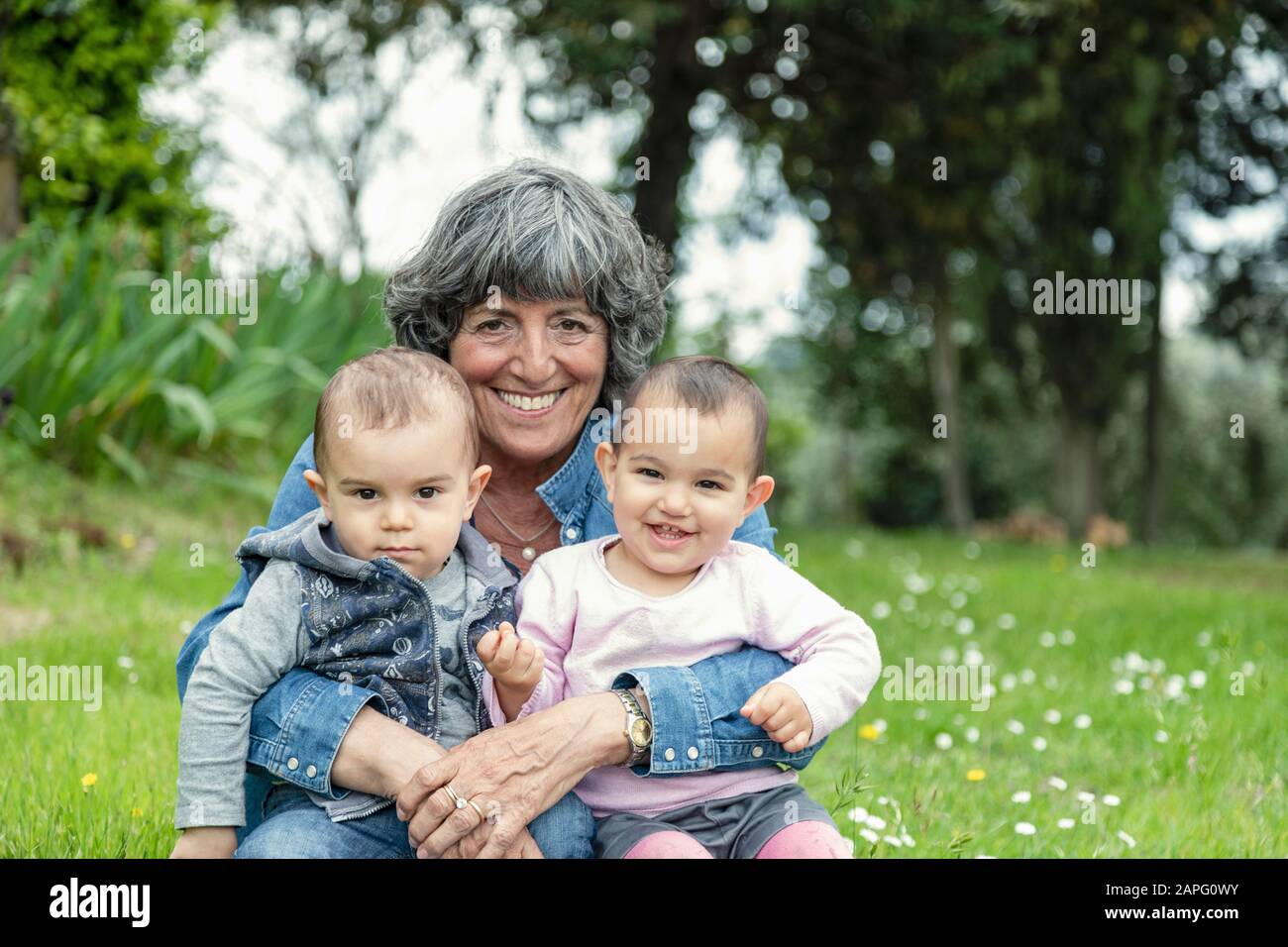 Grandmother grandchildren garden hi-res stock photography and images ...