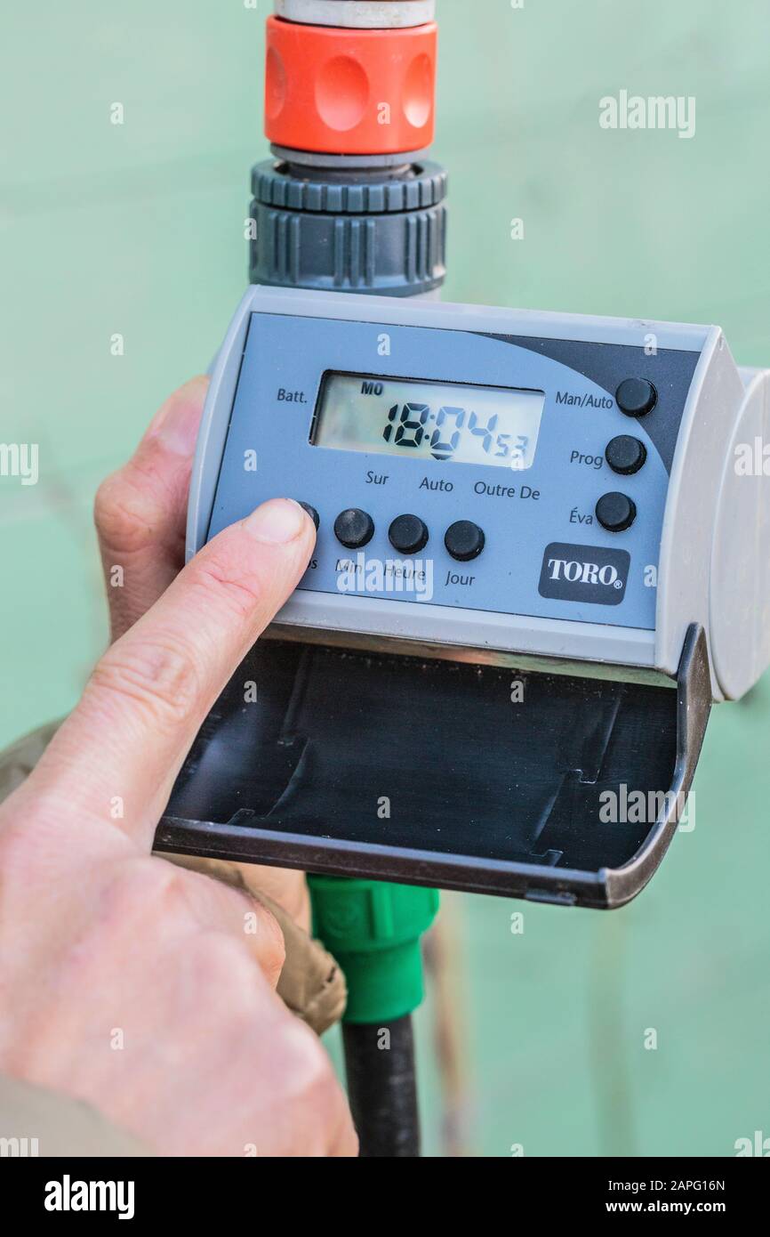 Installation of an automatic watering Stock Photo - Alamy