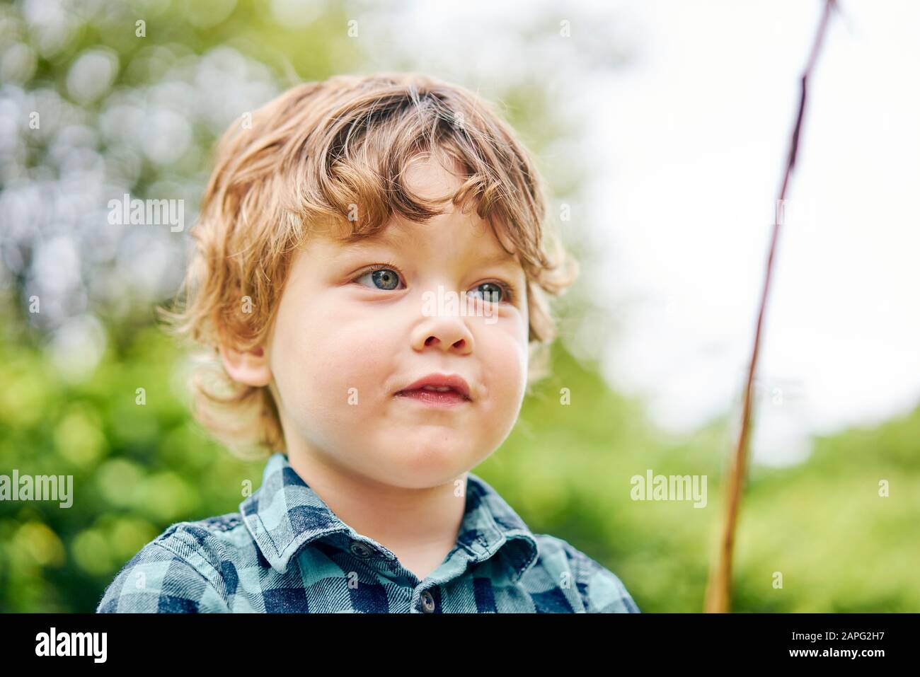 Toddler with stick hi-res stock photography and images - Alamy