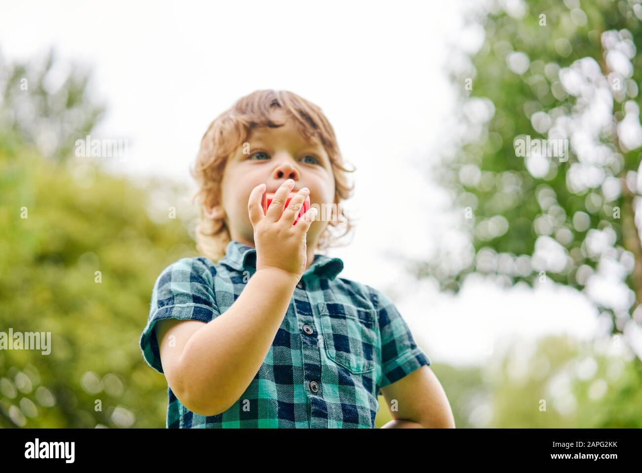 Biting toddler hi-res stock photography and images - Alamy
