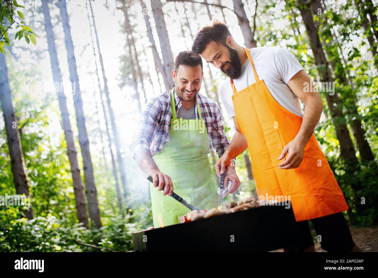 Barbecue party men hi-res stock photography and images - Alamy