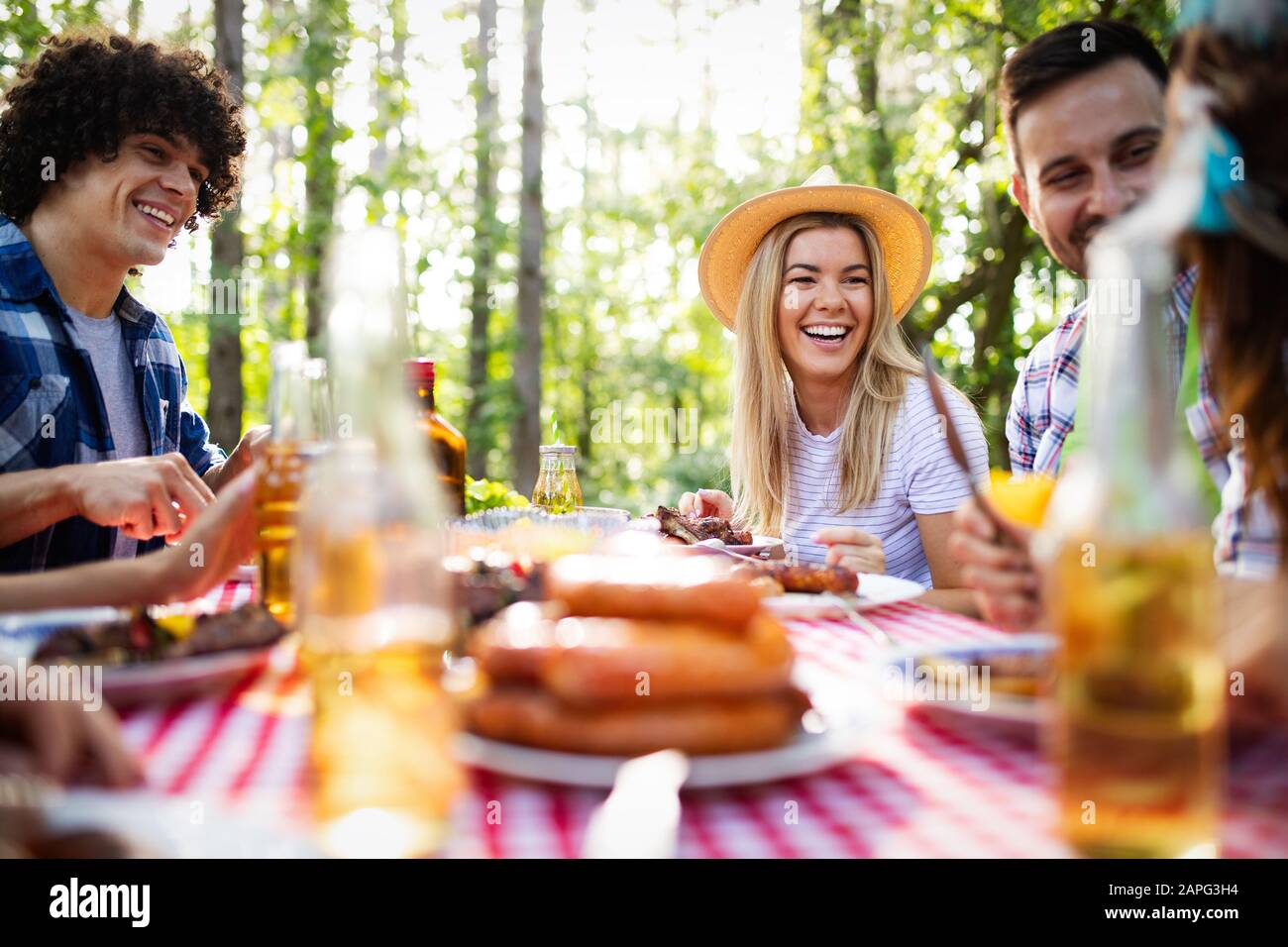 Group friends doing bbq in hi-res stock photography and images - Alamy