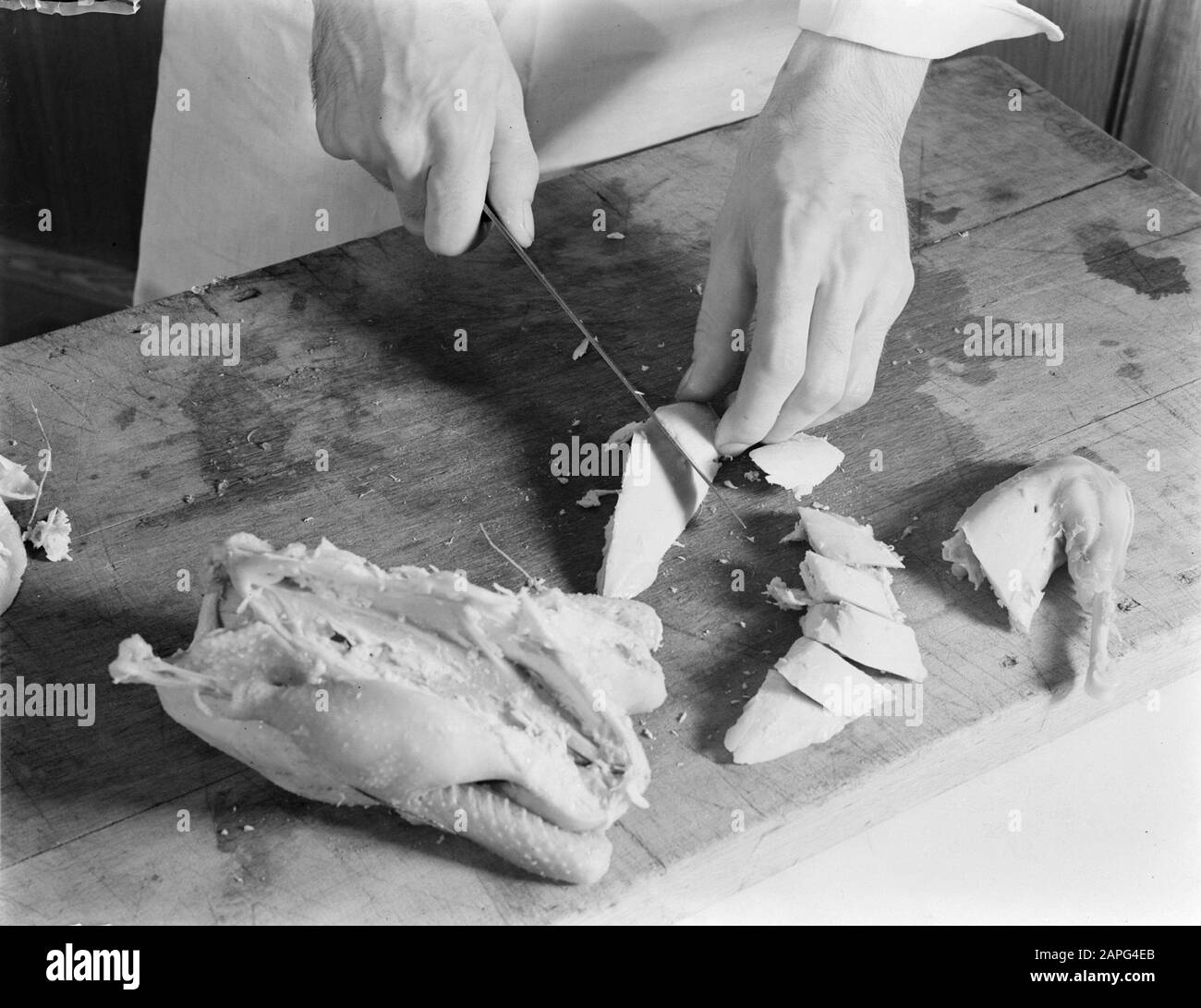 Chicken cooking Black and White Stock Photos & Images - Alamy