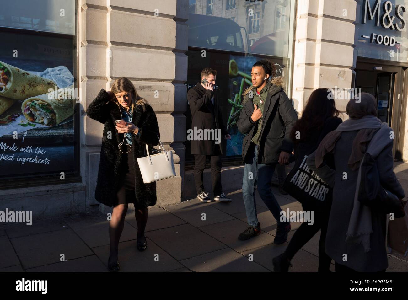 People using google maps for directions hi-res stock photography and ...
