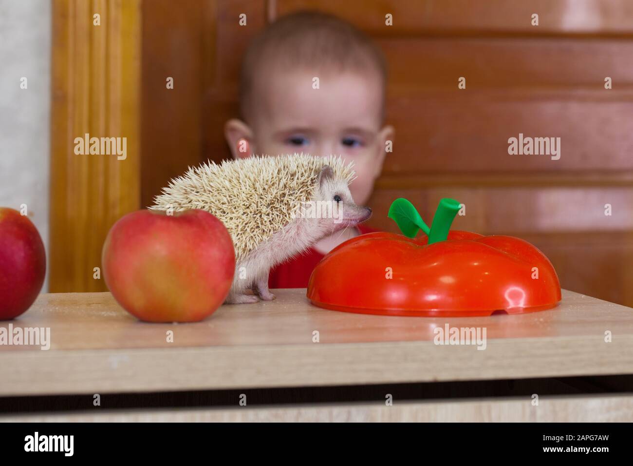 Little baby and oranges. Vitamins for children Stock Photo - Alamy
