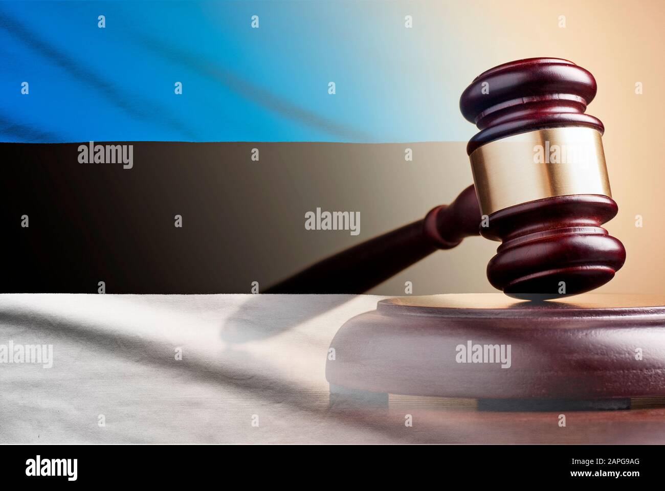 Lawyers wooden gavel over the flag of Estonia Stock Photo - Alamy