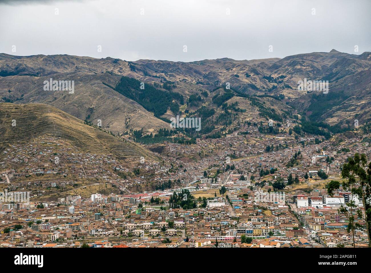 High angle shot of the colorful houses in a village by the mountains ...