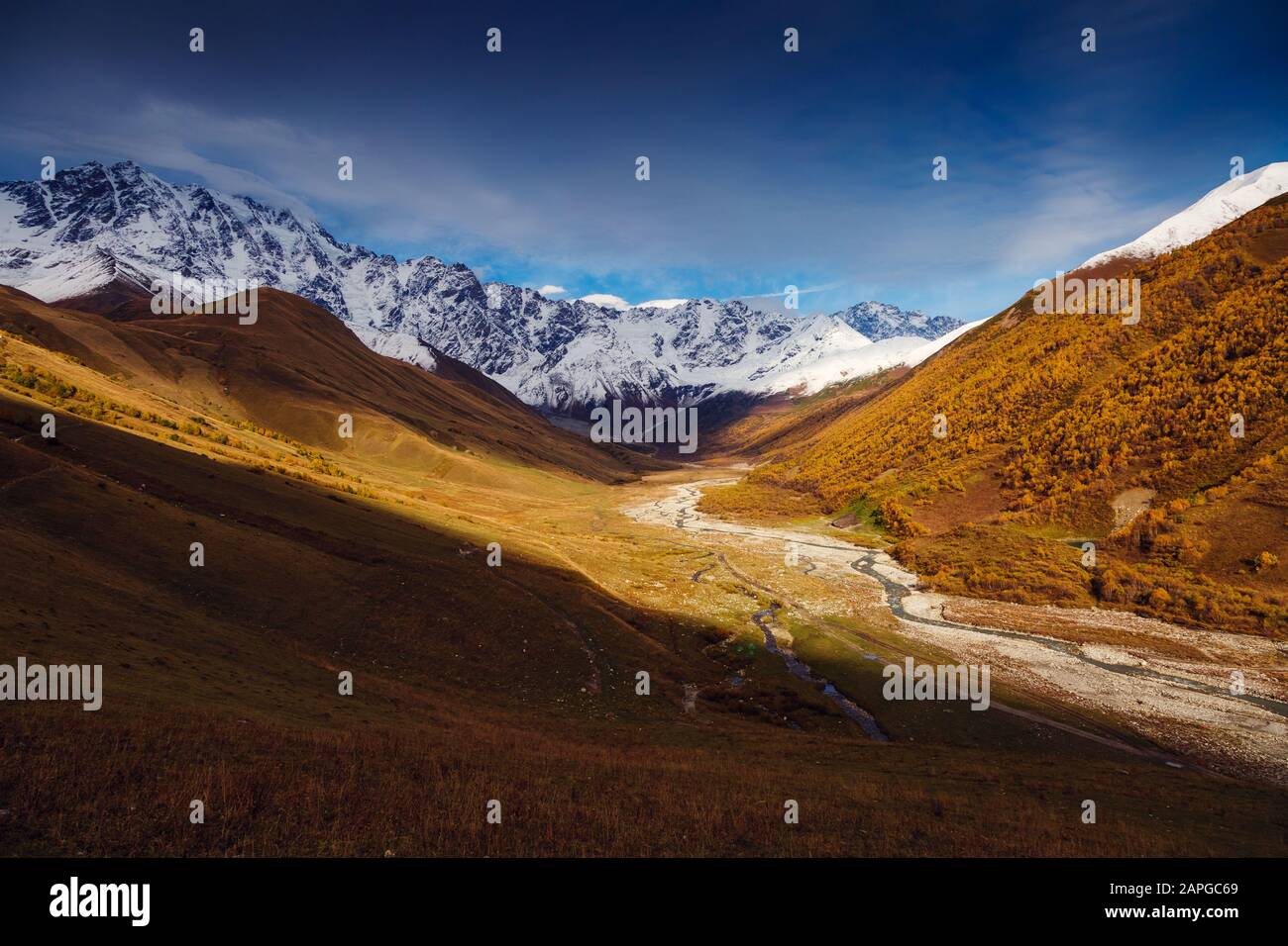 Fantastic view of the alpine valley at the foot of Mt. Shkhara ...
