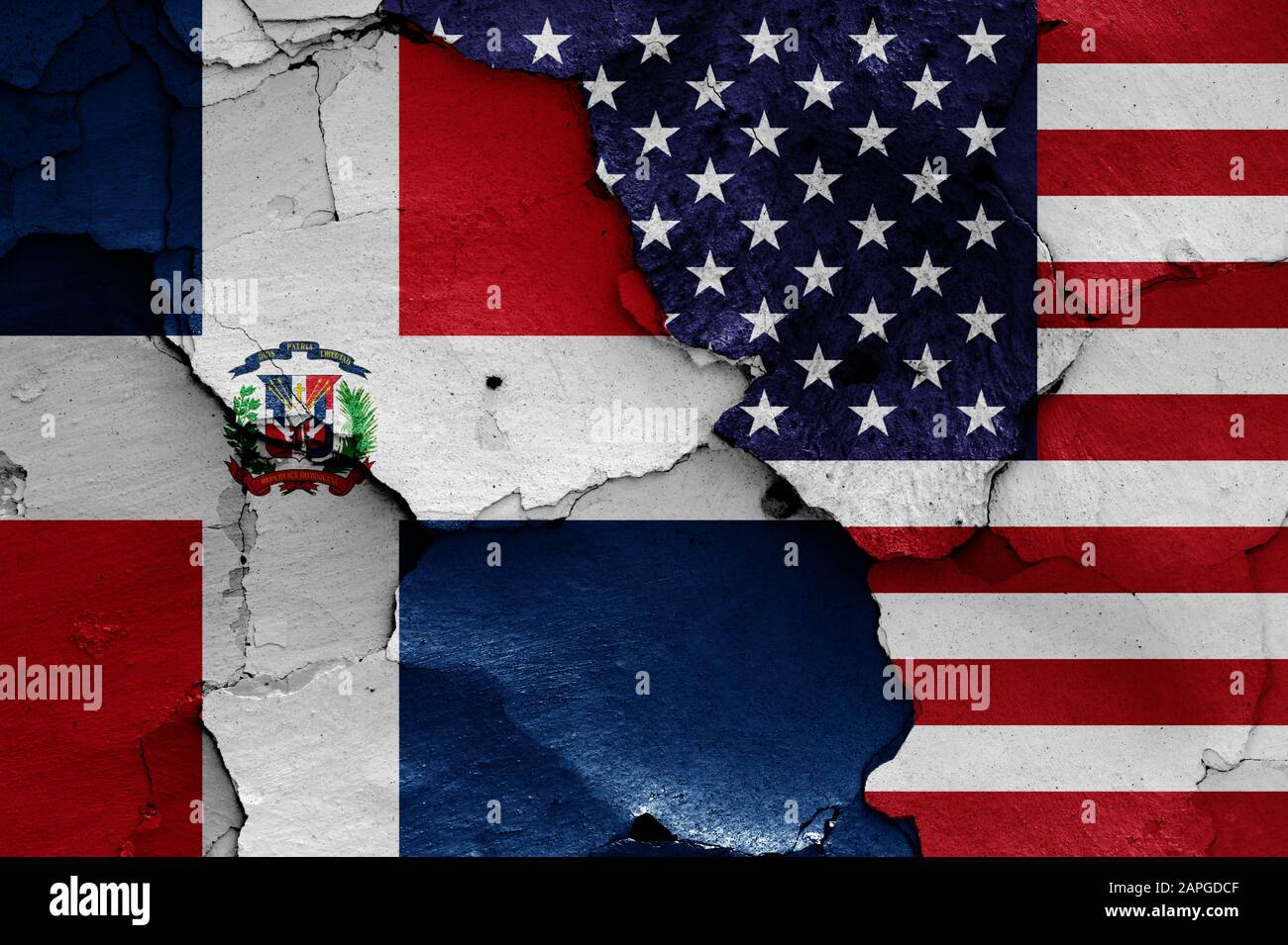 flags of Dominican Republic and USA painted on cracked wall Stock Photo ...