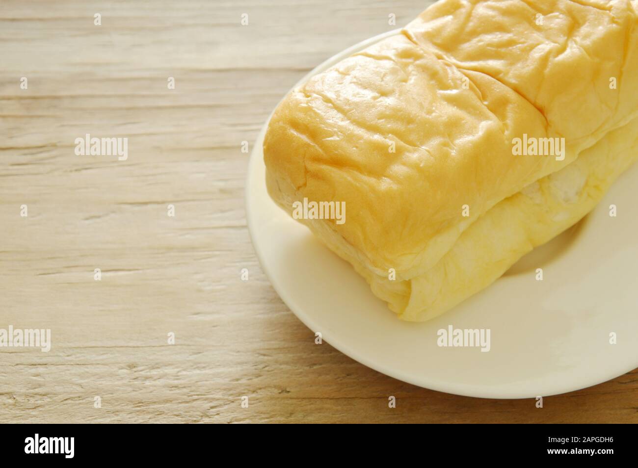 butter bread loaf on plate Stock Photo - Alamy