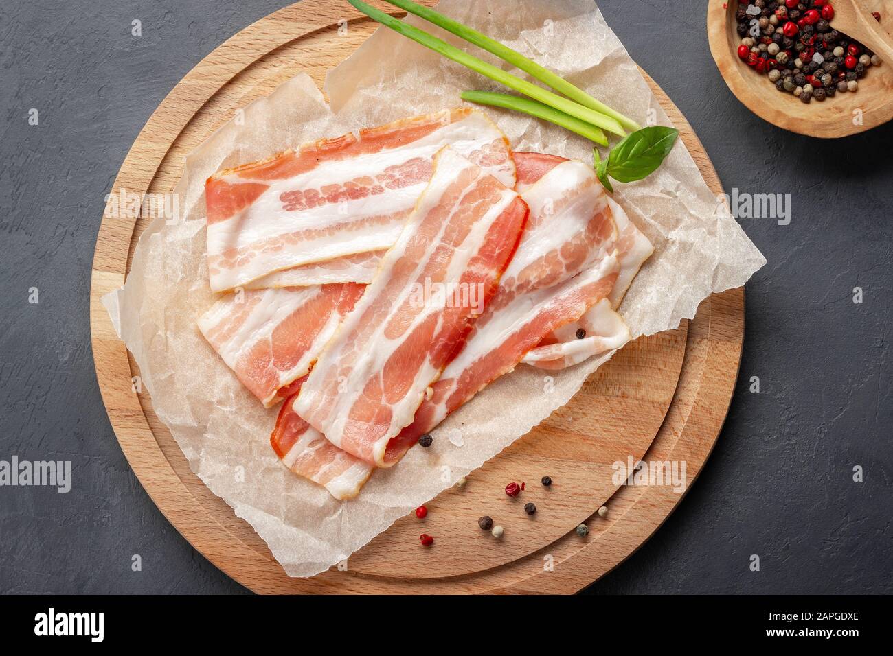 Raw sliced bacon. Top view Stock Photo - Alamy