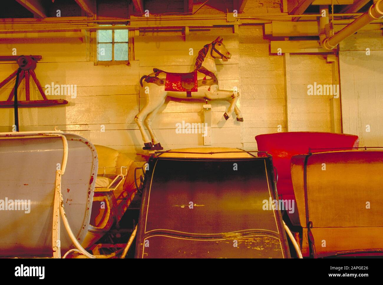 Clay horse character hanging on a wooden wall under the lights Stock ...