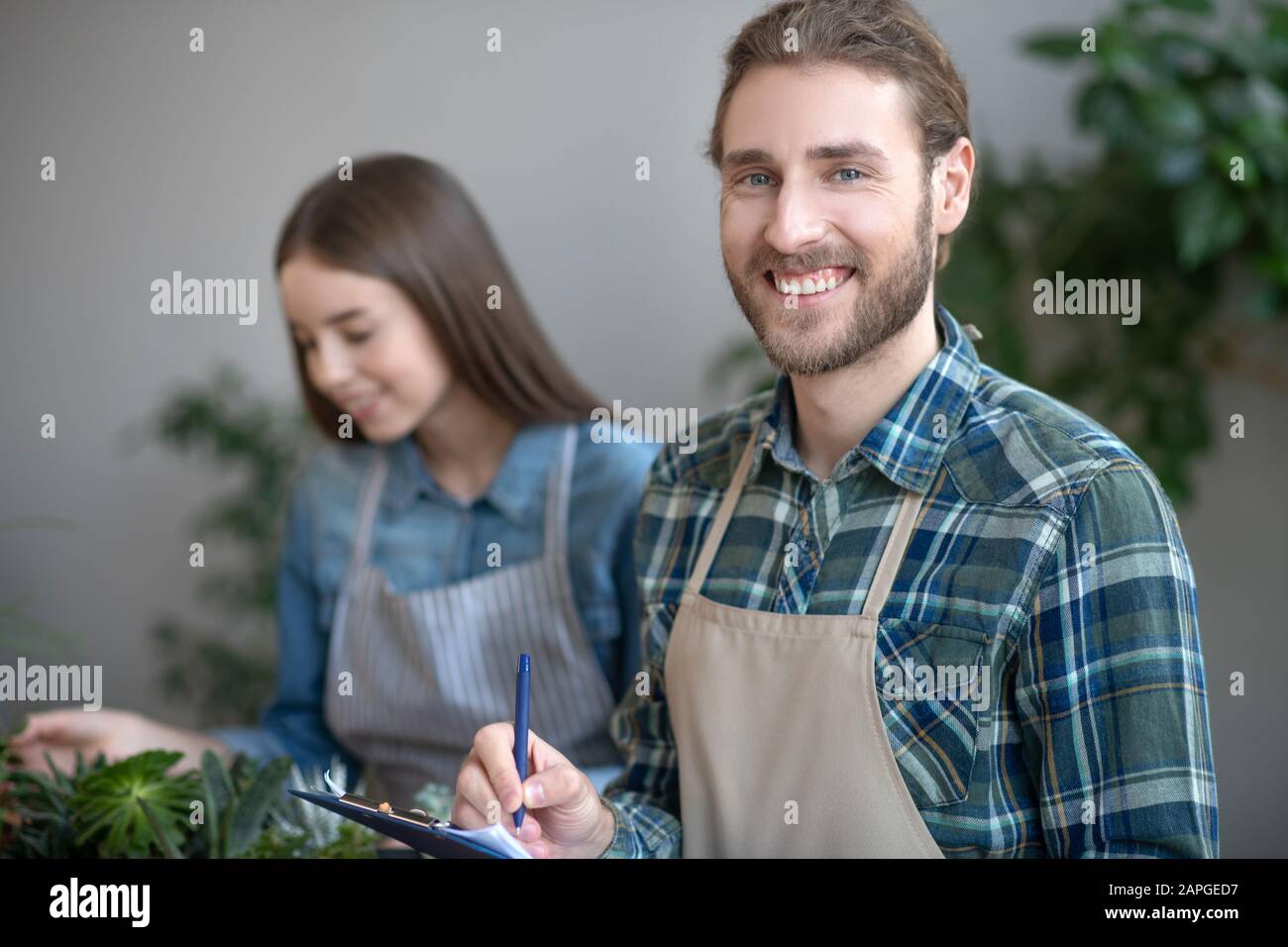 Beautiful office girl taking notes hi-res stock photography and images ...