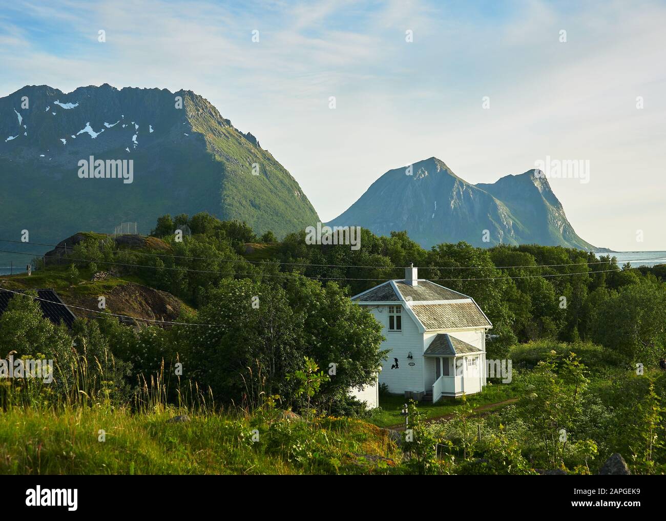 White house at the famous tourist attraction Hamn Village, Senja island ...