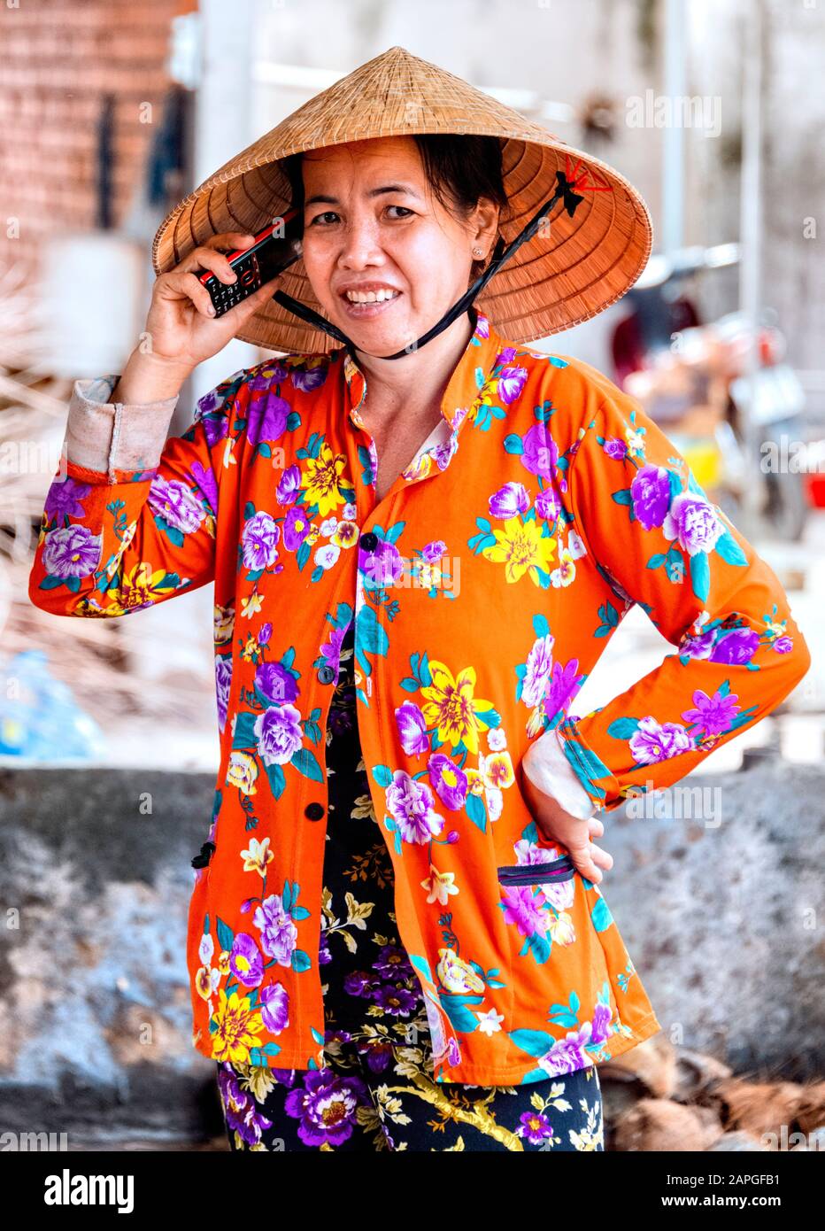 Lady wearing conical hat hi-res stock photography and images - Alamy