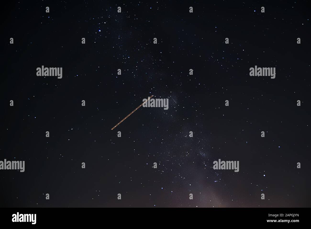 Beautiful shot of a shooting star in a starry night sky Stock Photo - Alamy