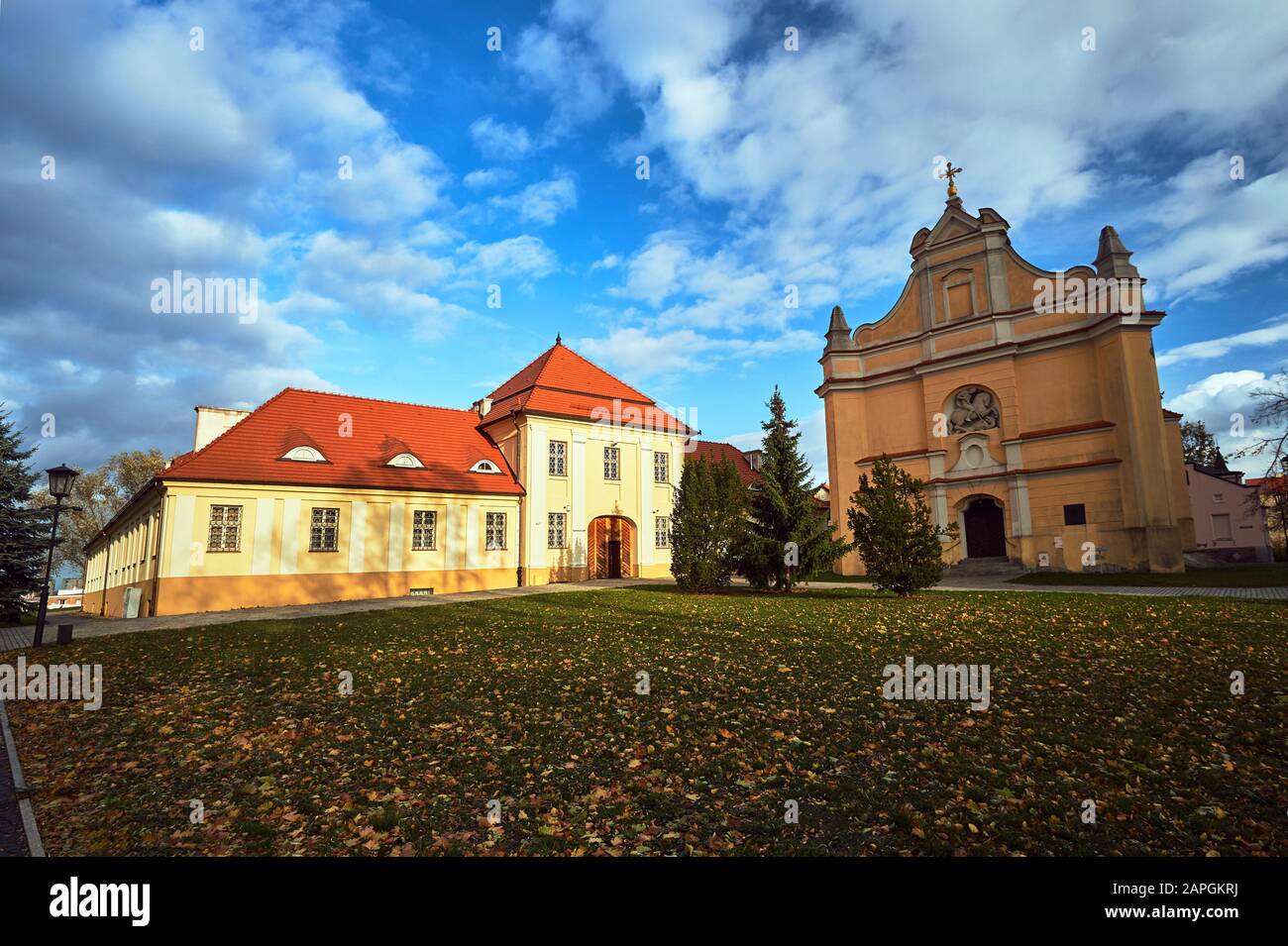 historic buildings and Baroque facade of the church in Gniezno Stock ...