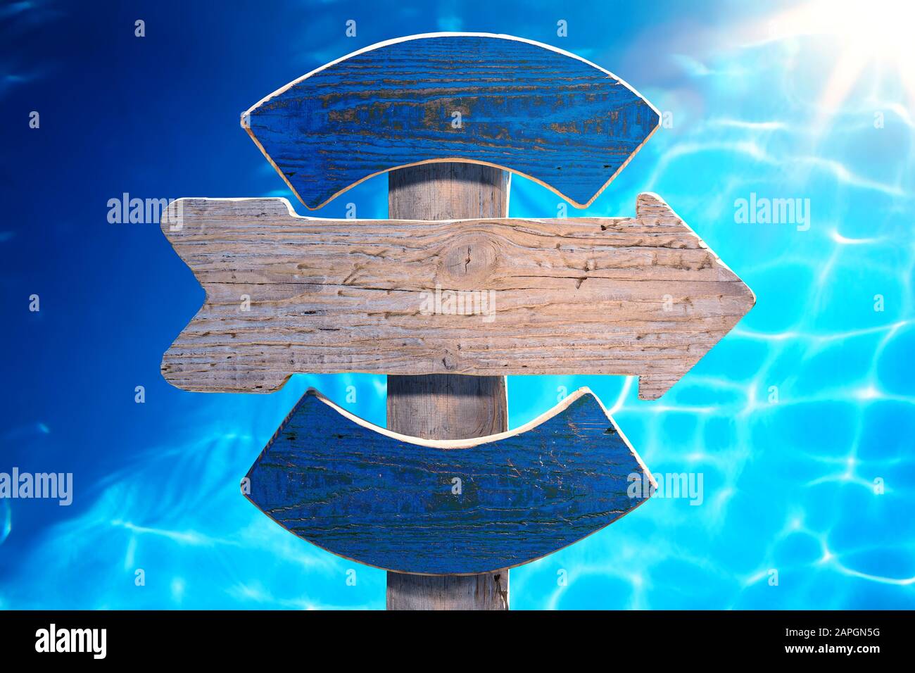 beach signboard on blue water background Stock Photo - Alamy
