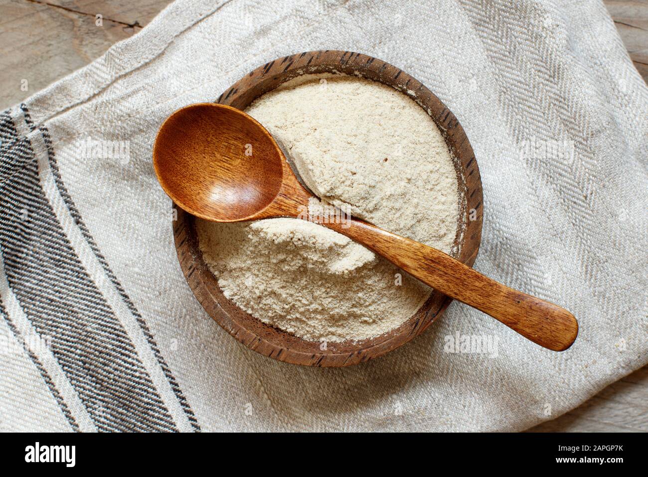 Teff flour in a bowl with a spoon top view Stock Photo - Alamy