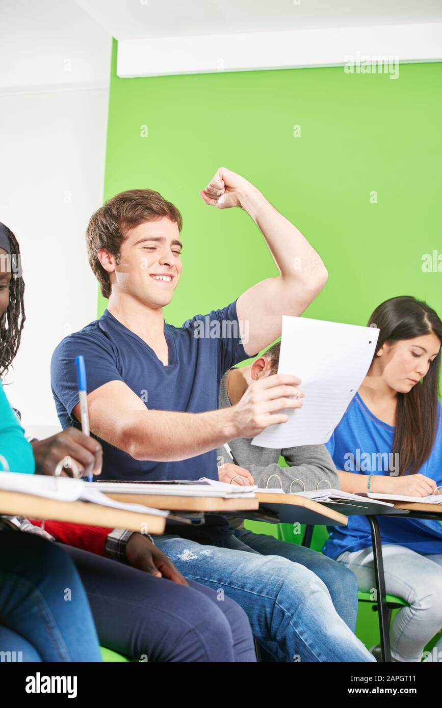 Successful student cheers after exam at school Stock Photo - Alamy