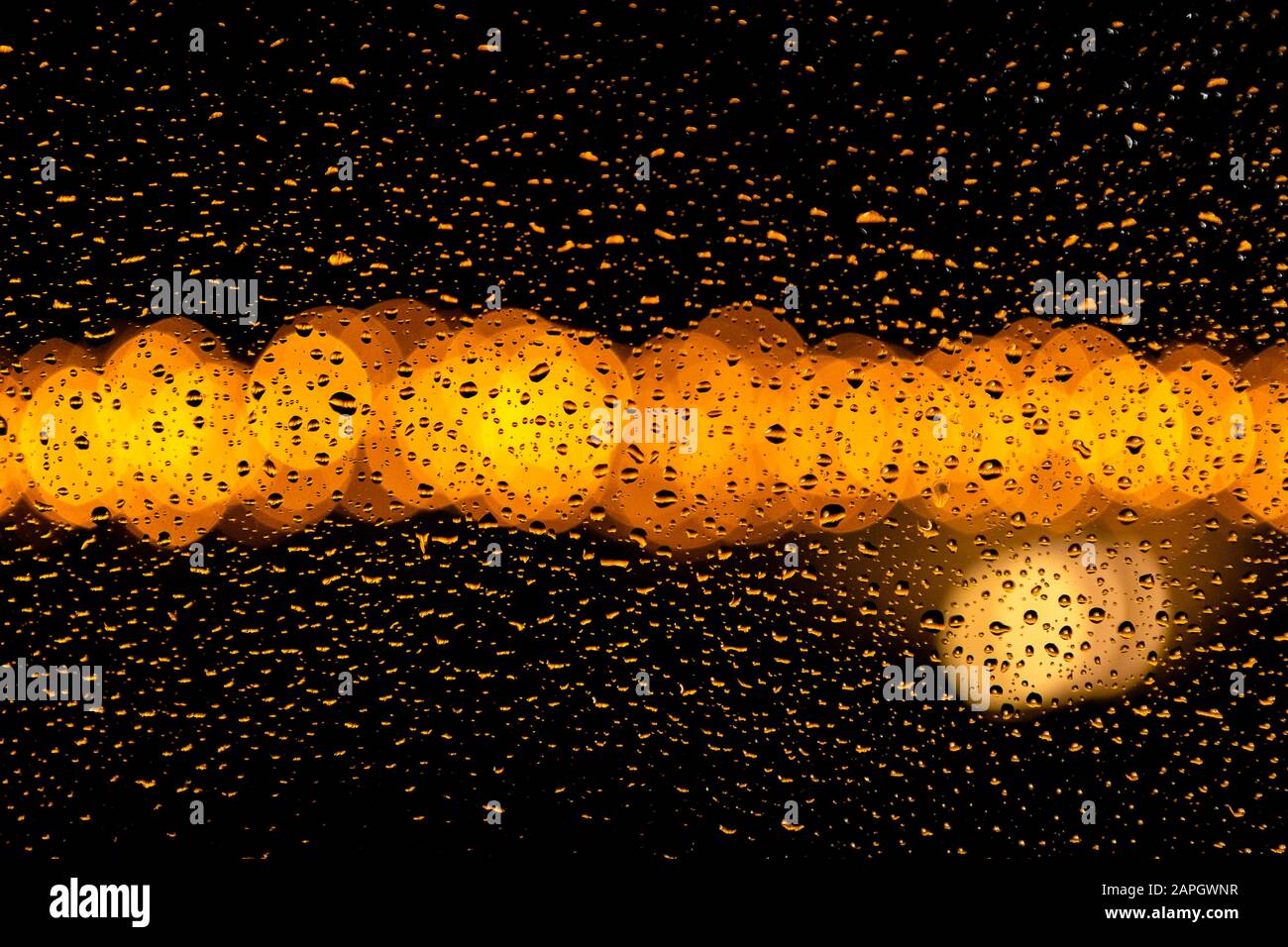blurry lights and raindrops on window Stock Photo - Alamy