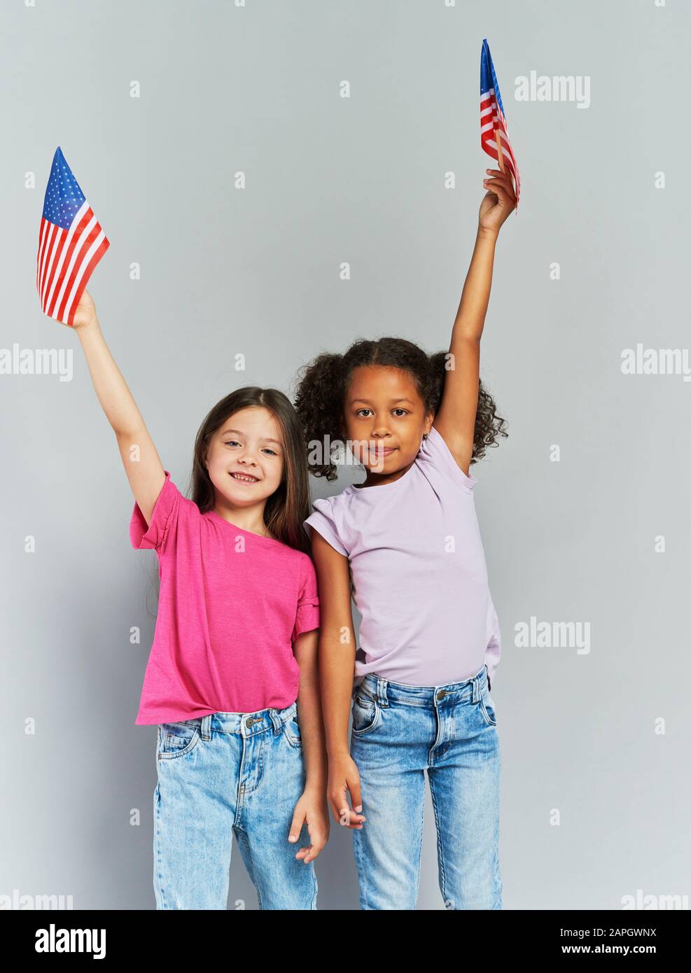 Girls waving flags hi-res stock photography and images - Alamy