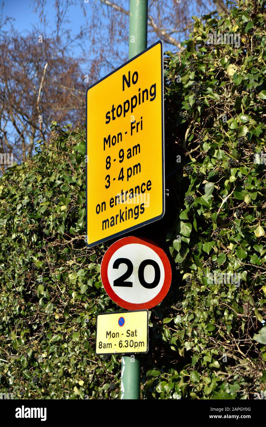 Maidstone, Kent, UK. Street signs: 20mph no stopping zone (near two ...