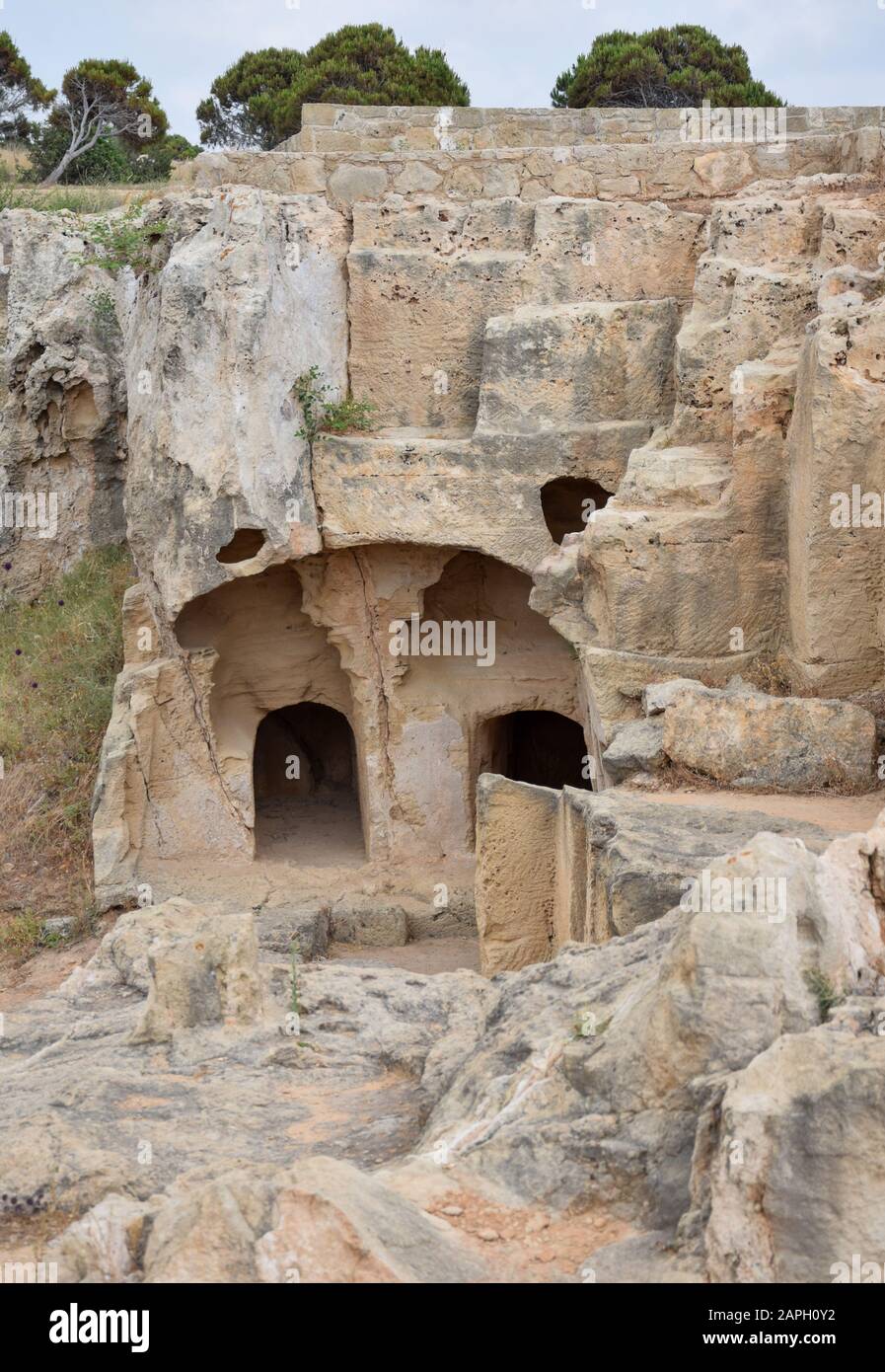 Two arched doorways lead into an ancient ruined building in Paphos ...