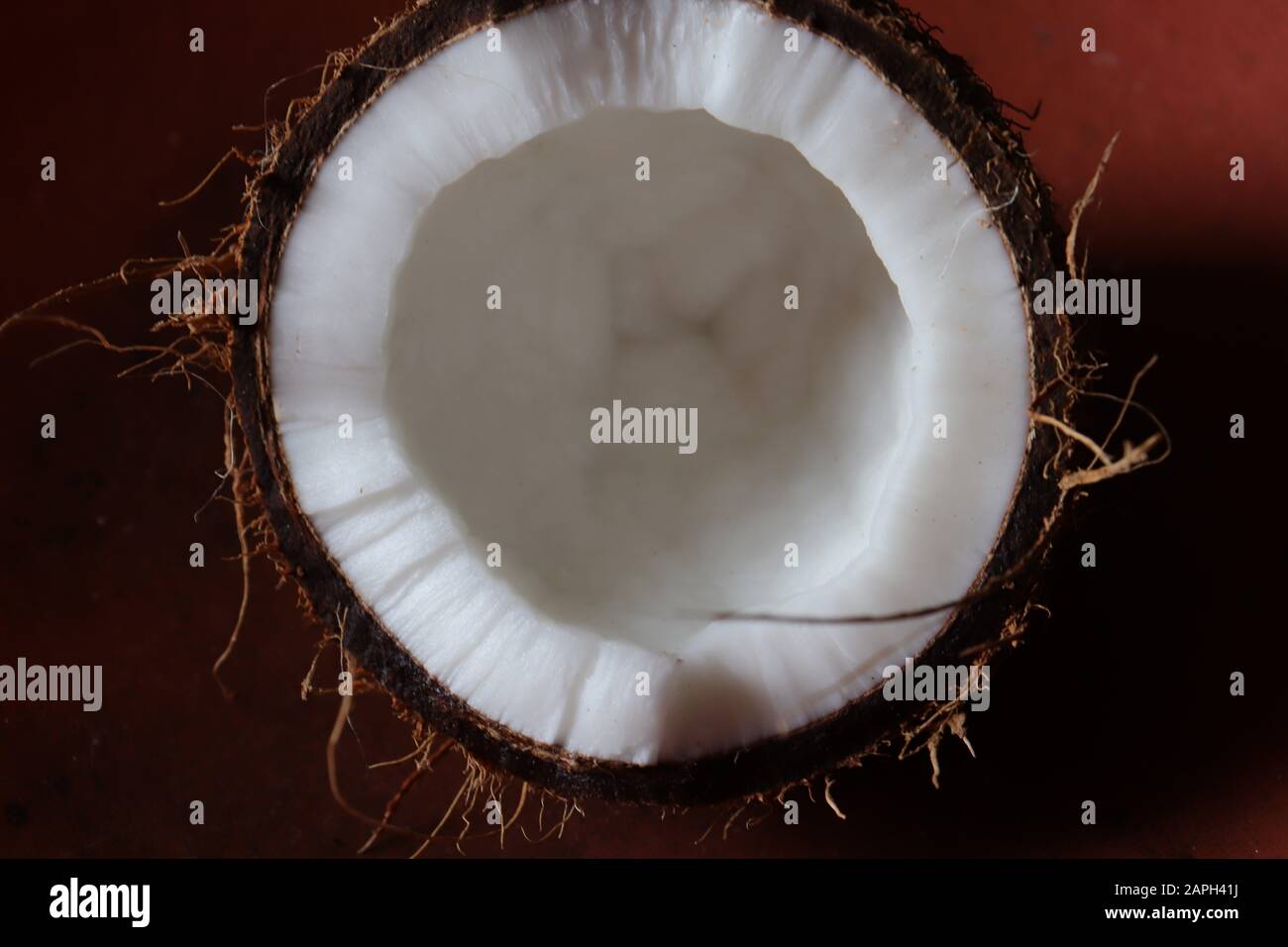 Close-up of half-cut coconut Stock Photo - Alamy