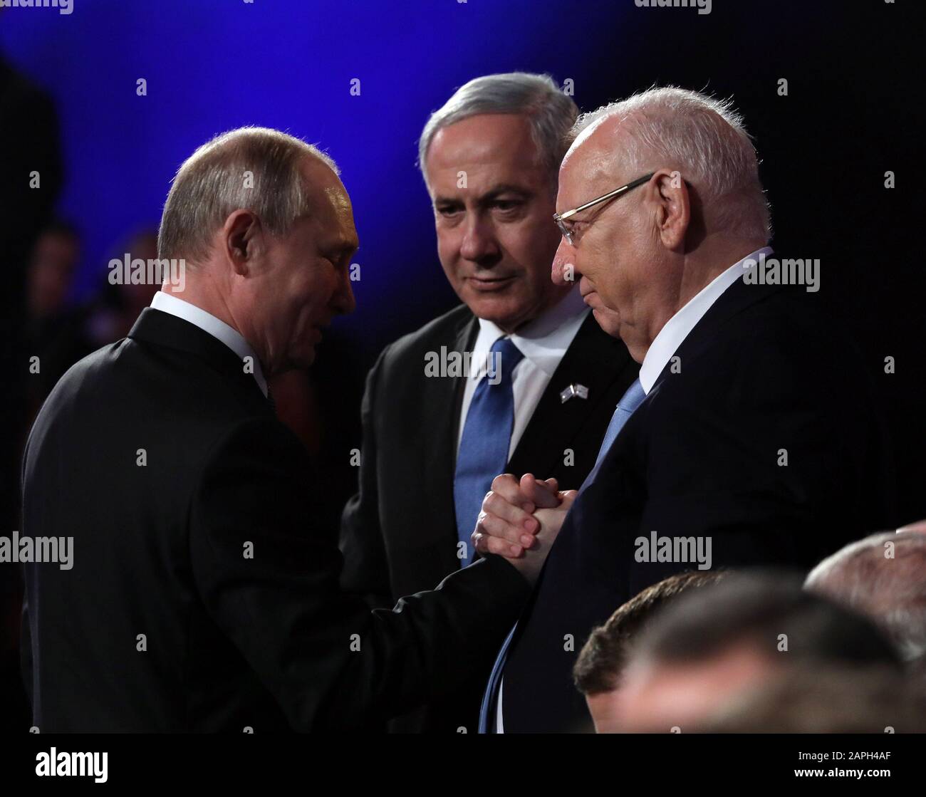 Jerusalem, Israel. 23rd Jan, 2020. Russian President Vladimir Putin shakes hands with Israeli ...